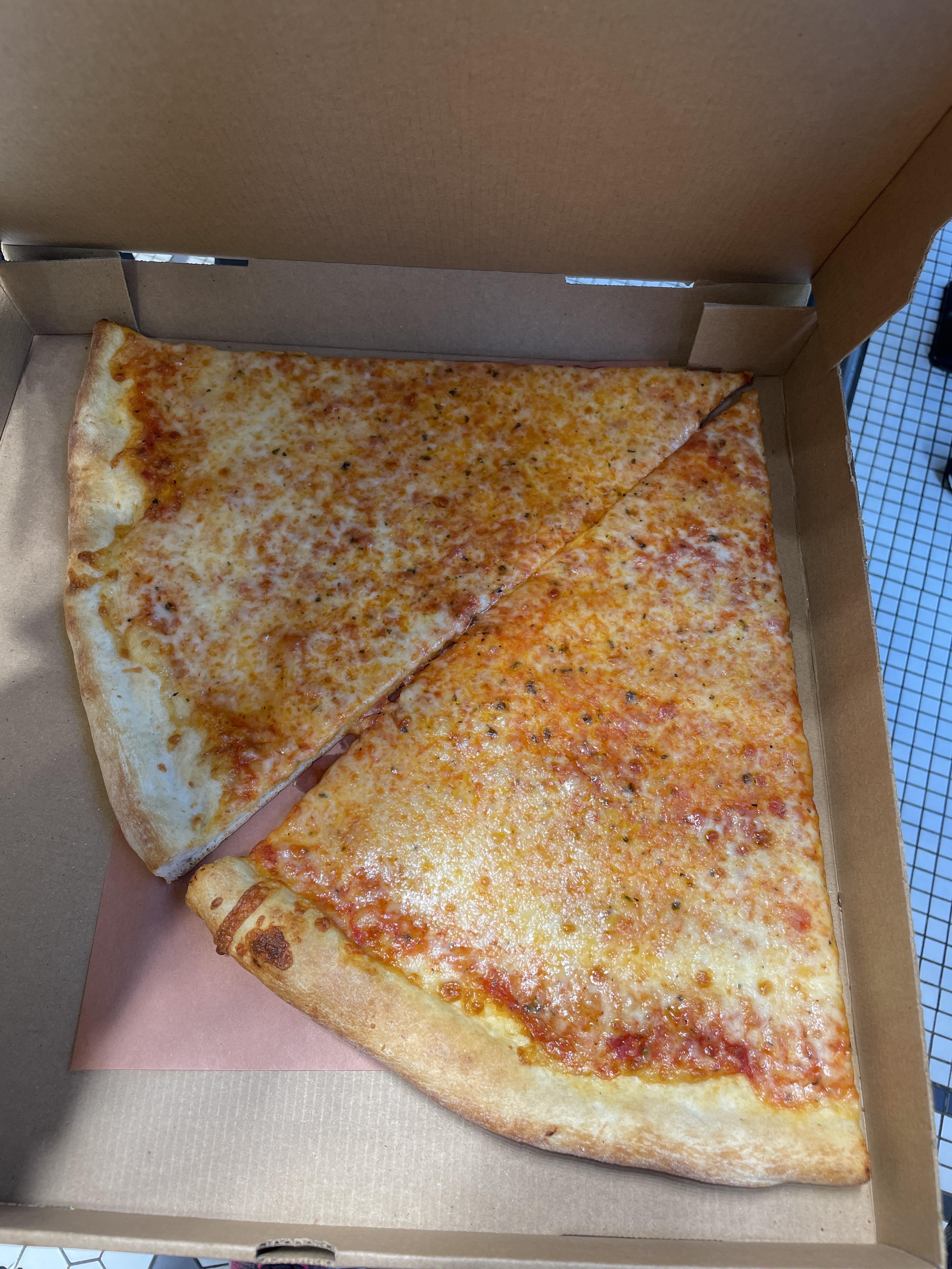 Two big slices I got at a random place in New York - Dining and Cooking