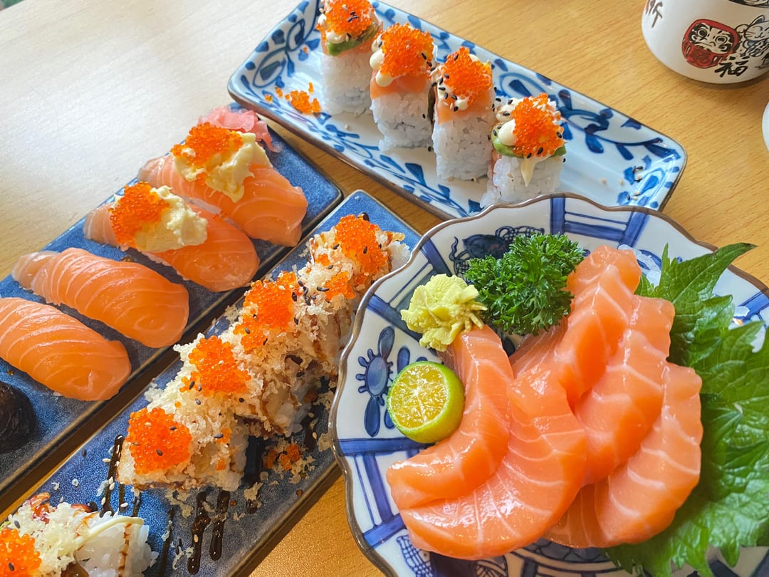 Salmon Sushi/Rolls and Sashimi! Also first time seeing and having ...