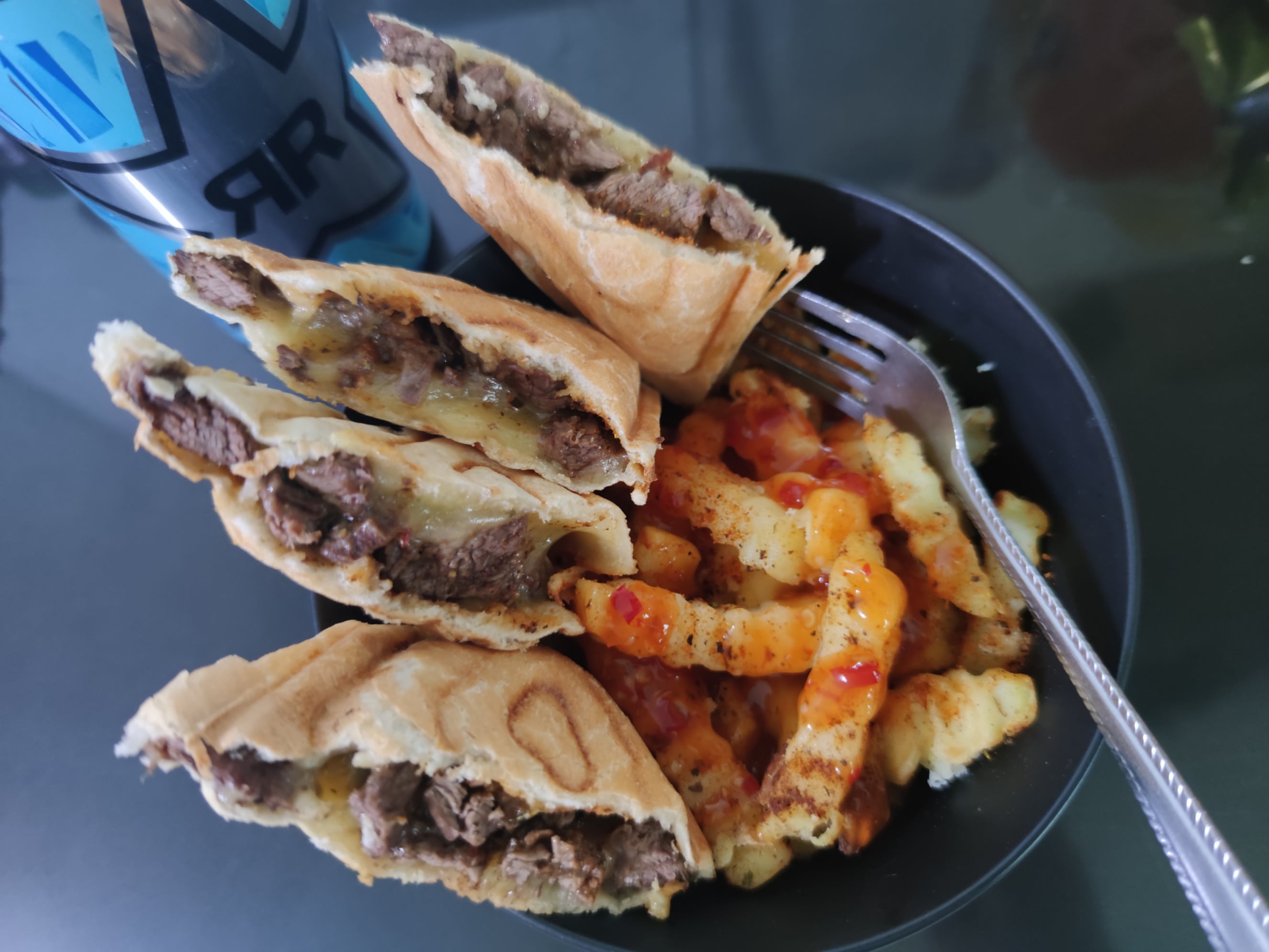 Panini pressed with eye fillet & crinkle cut chips. Sweet chilli sauce ...