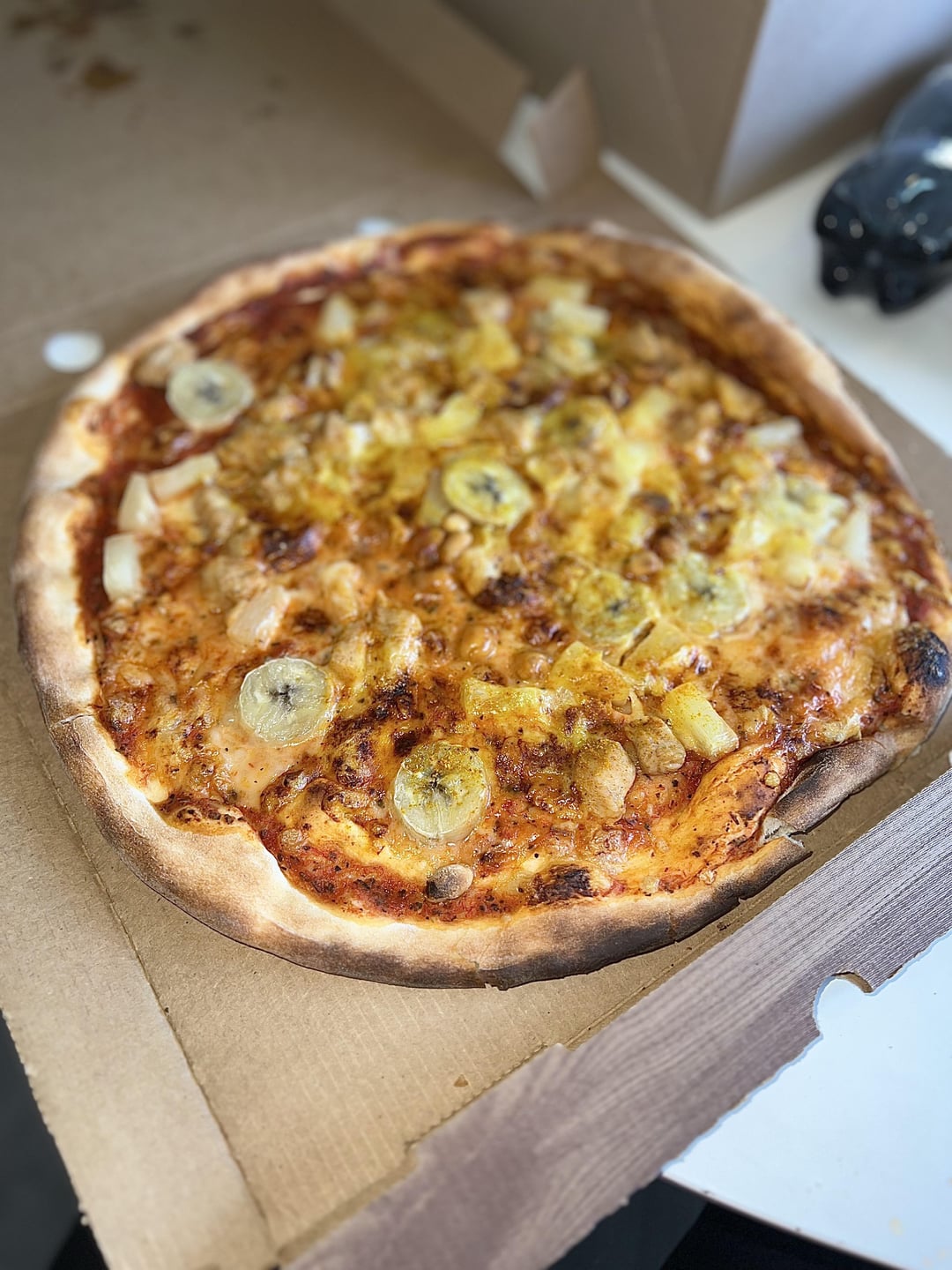 Indiana; pizza with banana, chicken, curry, pineapples and nuts. My ...