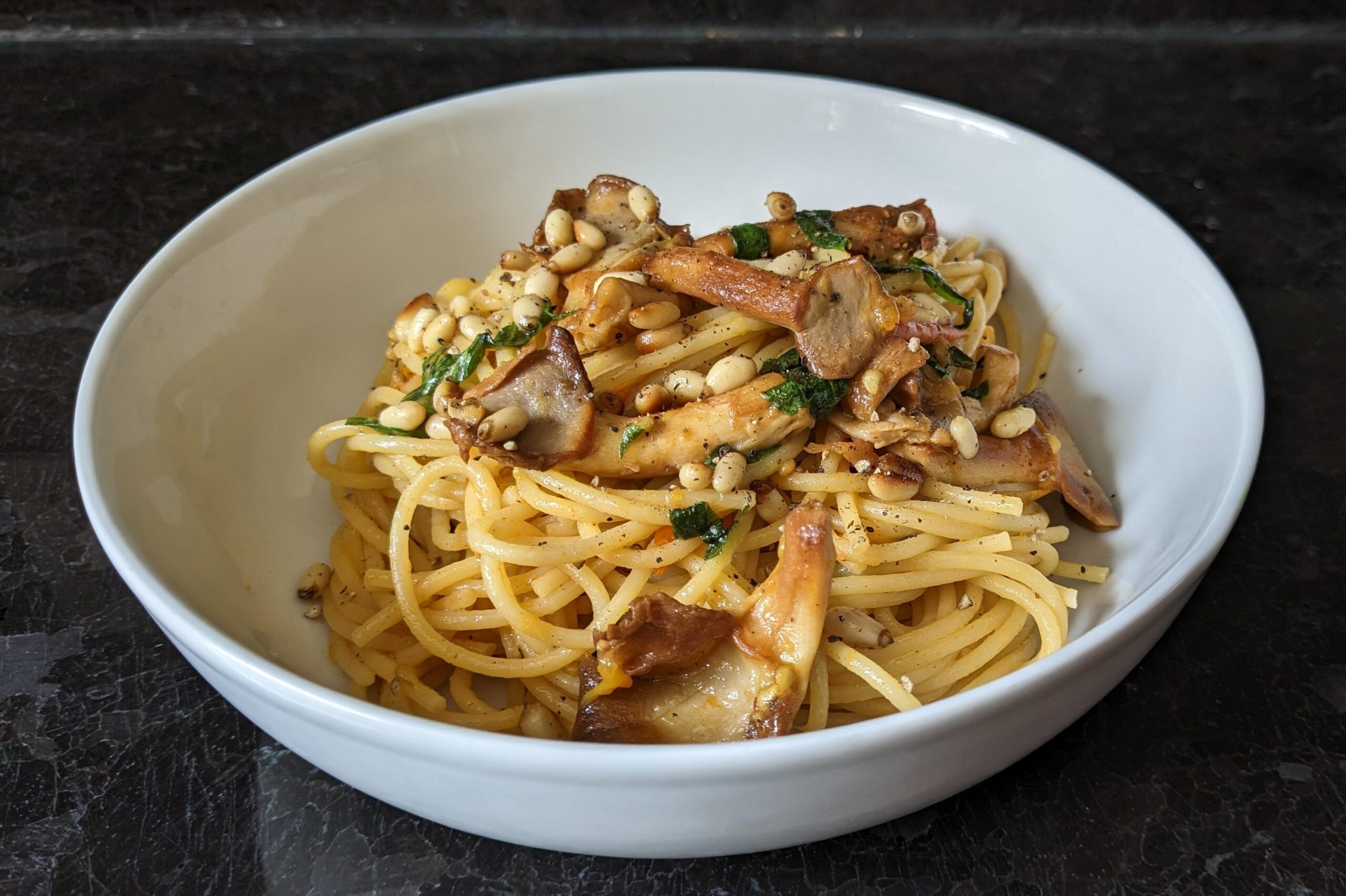 Spaghettini with fried Italian oyster mushrooms, stewed cherry tomatoes ...