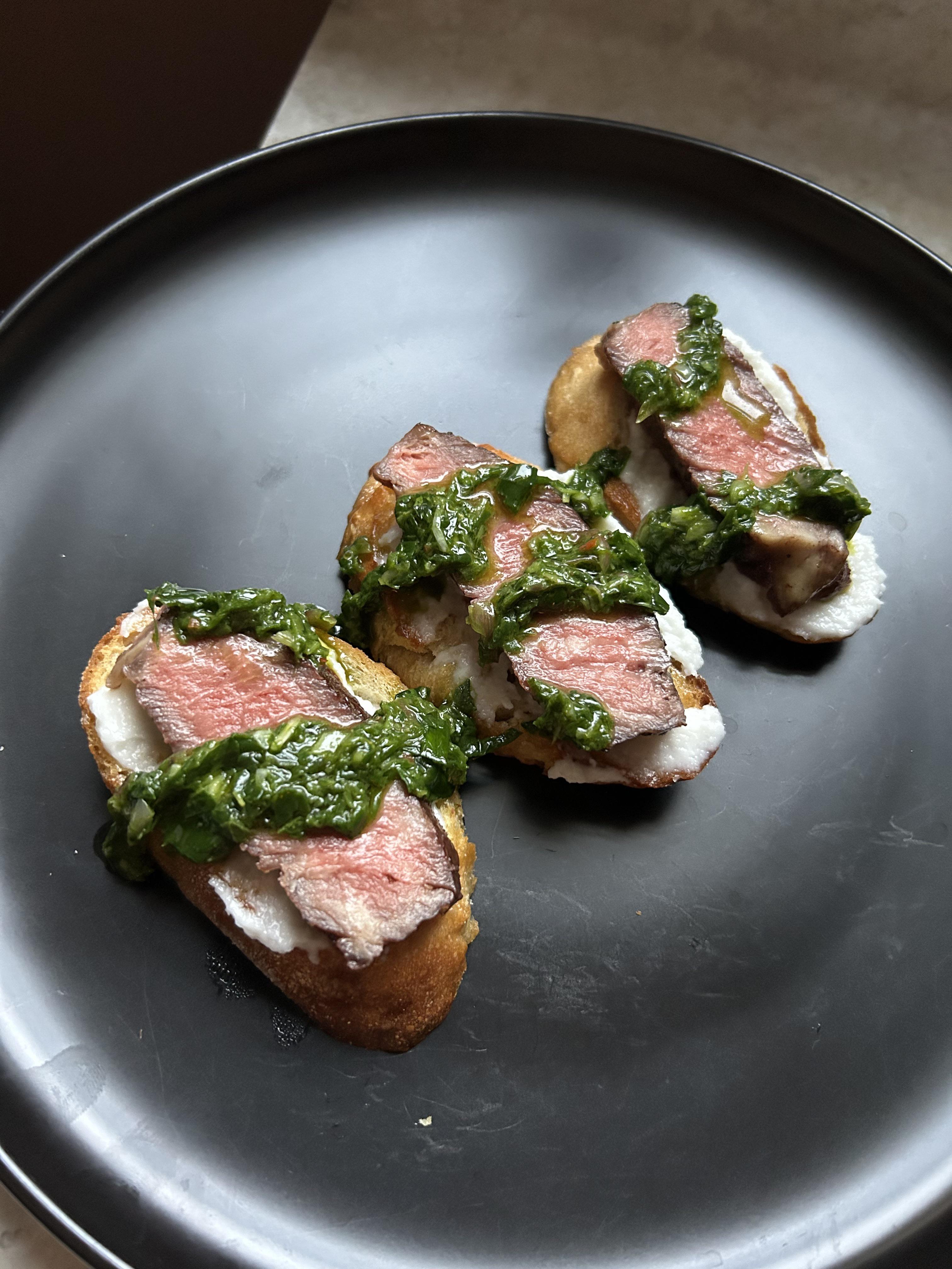 [homemade] crostini w roasted garlic spread, reverse seared ribeye, and ...