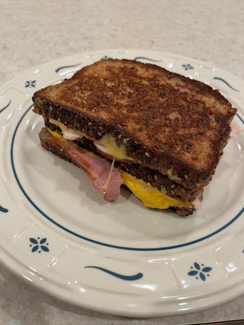 Drunk triple decker club and cheese toastie fried in bacon grease ...