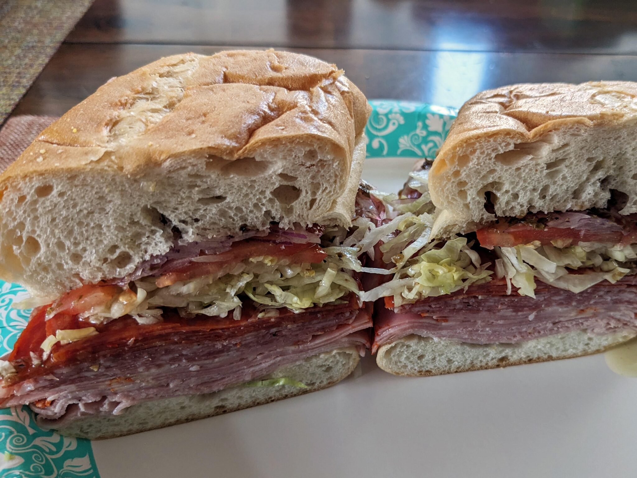 Cold cuts with lettuce, tomato, onion, and dressing. Forgot cheese in ...