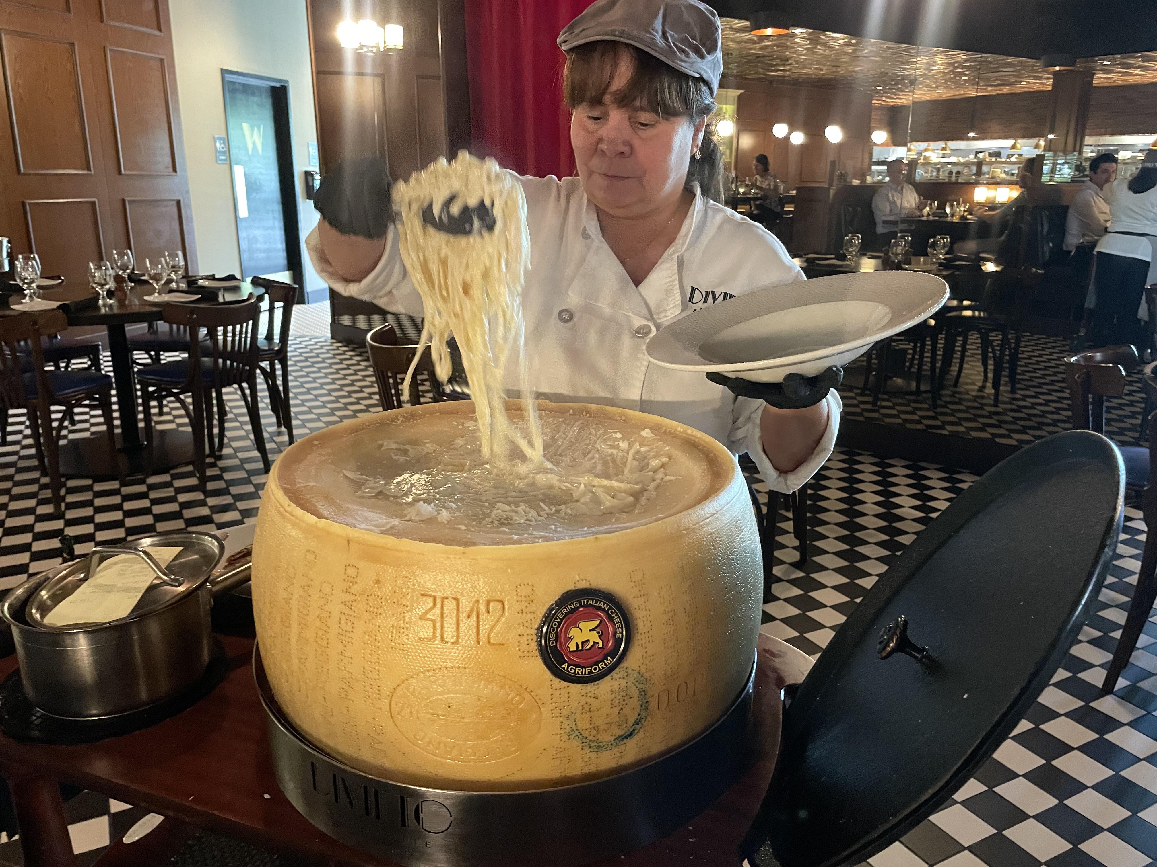 Ruota di parmigiana!! This is fettuccine Alfredo that is served out of ...