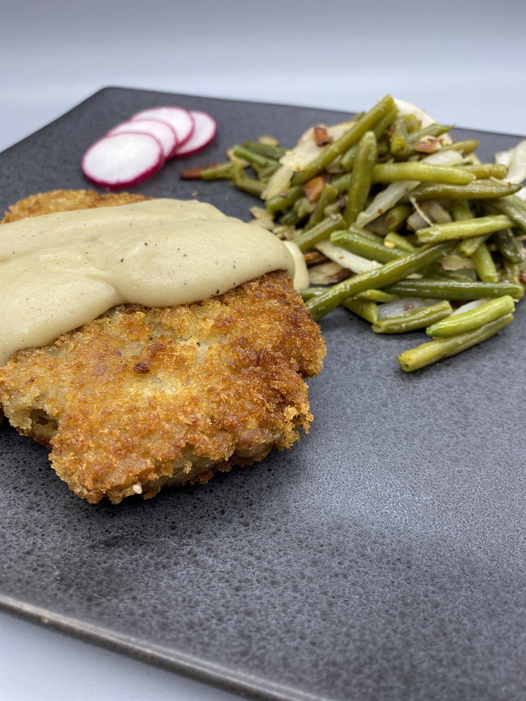 Homemade Seitan Schnitzel with country gravy and almond green beans ...