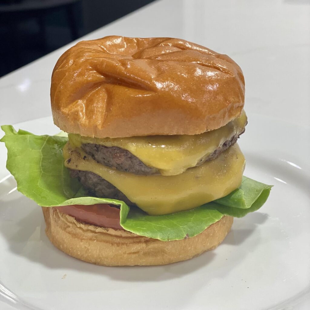 Homemade Double Cheeseburgers on a Brioche Bun - Dining and Cooking