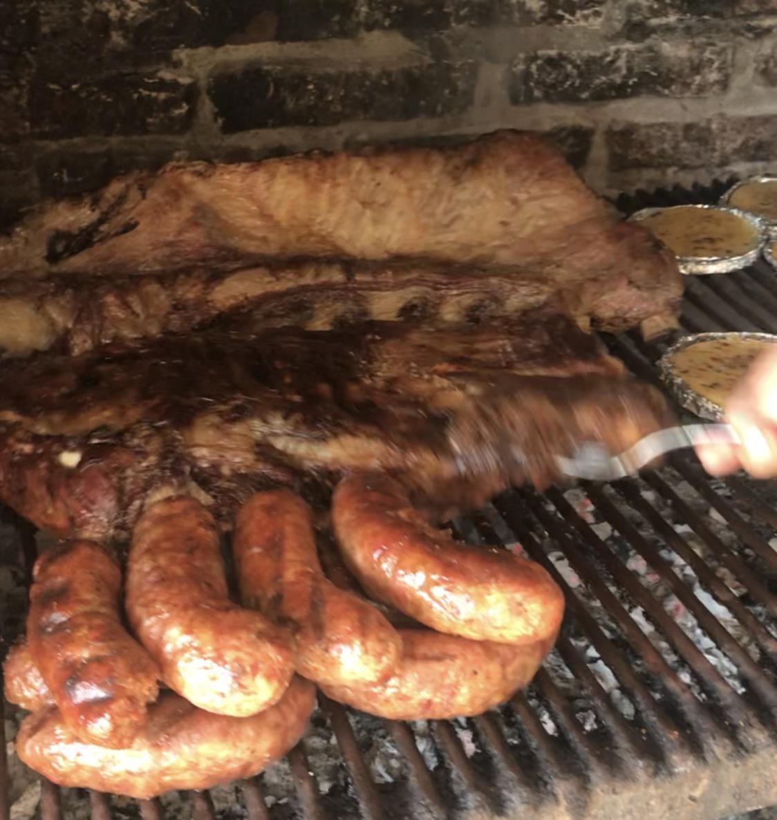 Argentinian BBQ. Chorizo, morcilla, chinchulin, provoleta y costillar ...