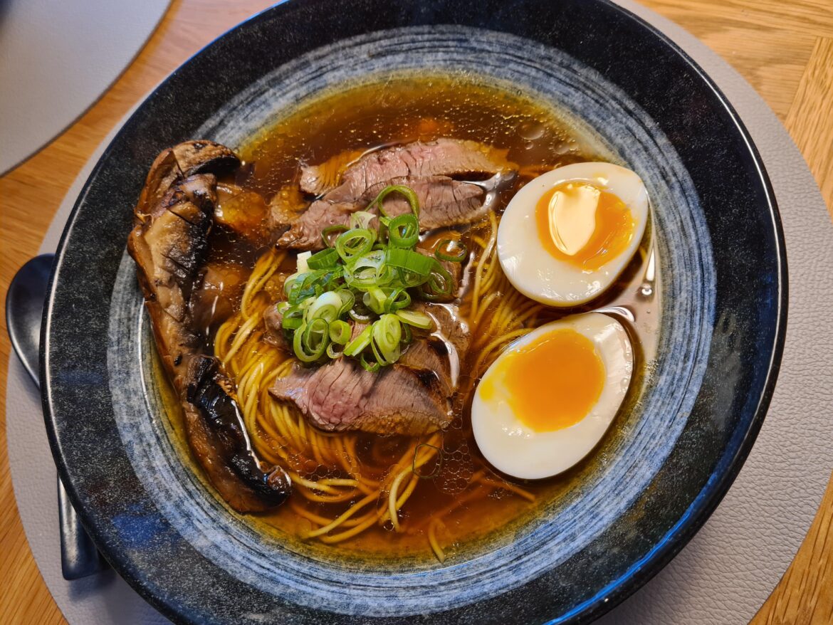 Beef shoyu chintan on oxtail and scrap tendon. Topped with portobello ...