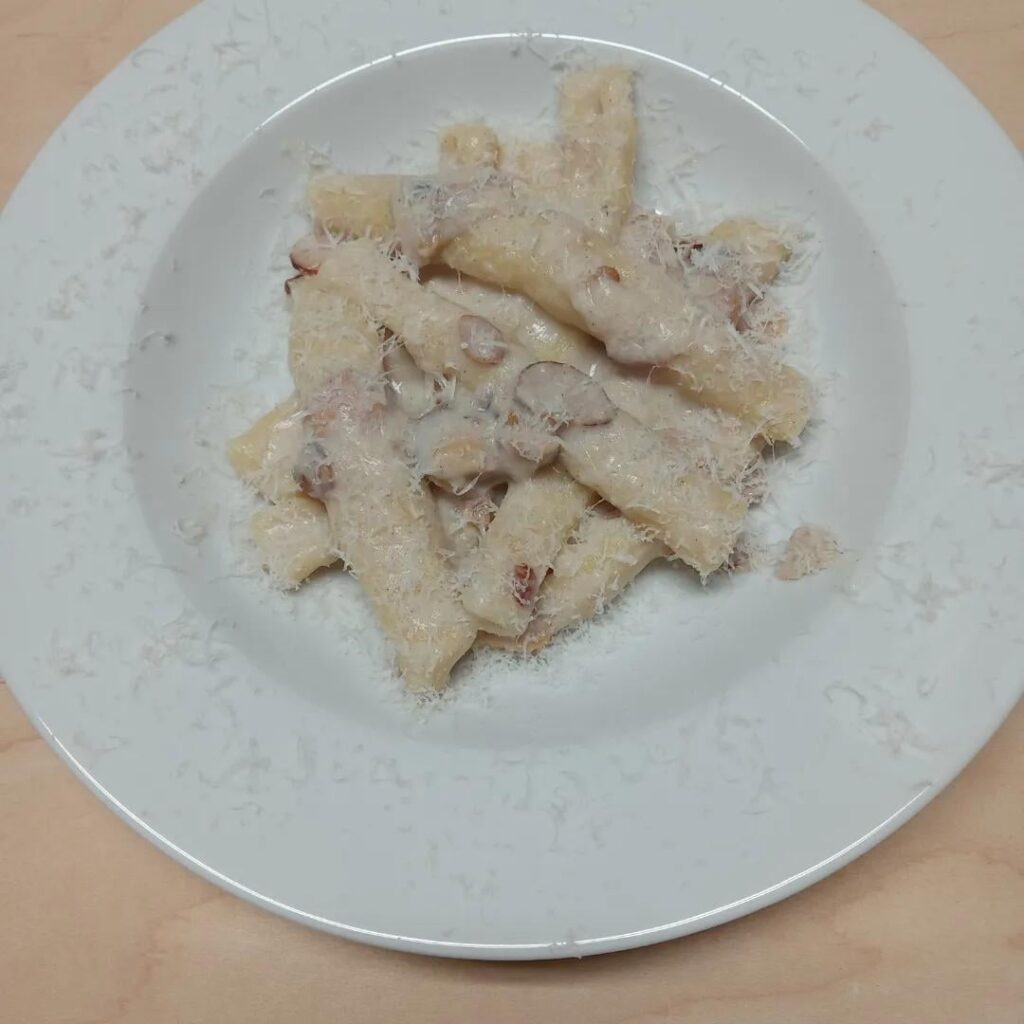 Long Capunti with brown almond sauce - Dining and Cooking