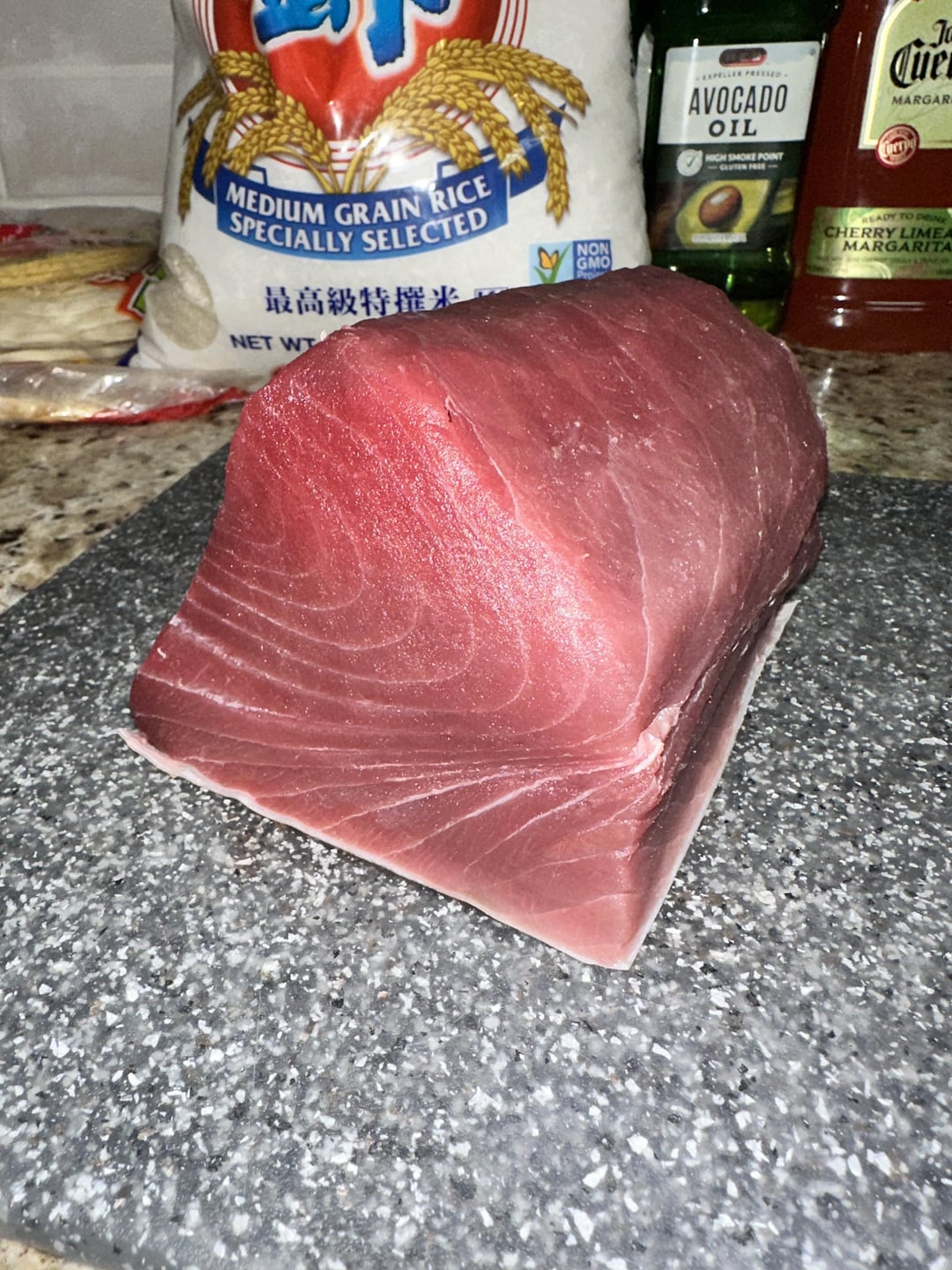Bought myself a 2.5lb slab of yellowfin and made some nigiri, sashimi ...