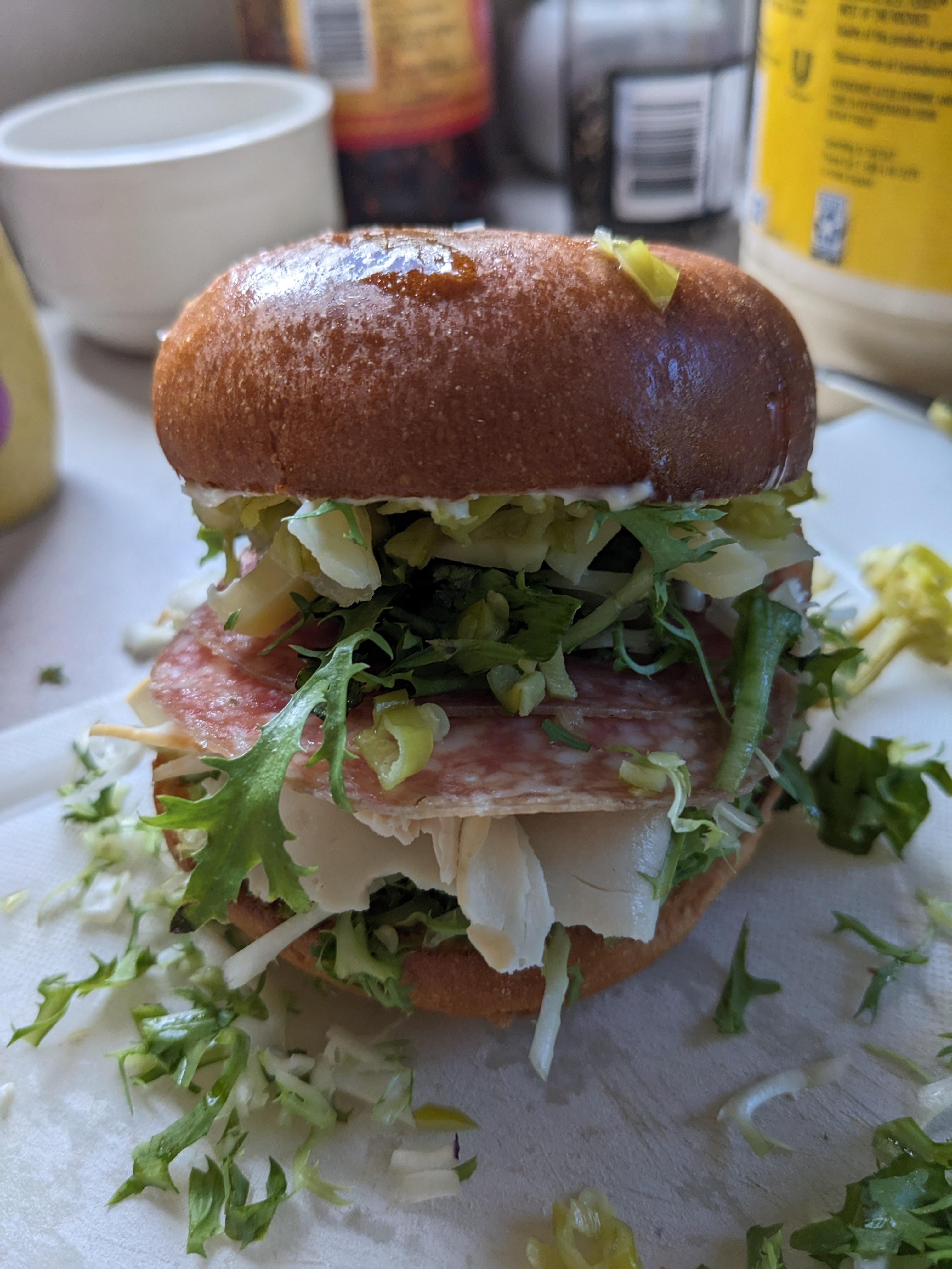 Turkey, salami, mayo, cheddar, chopped pepperoncini, chopped Frisbee ...