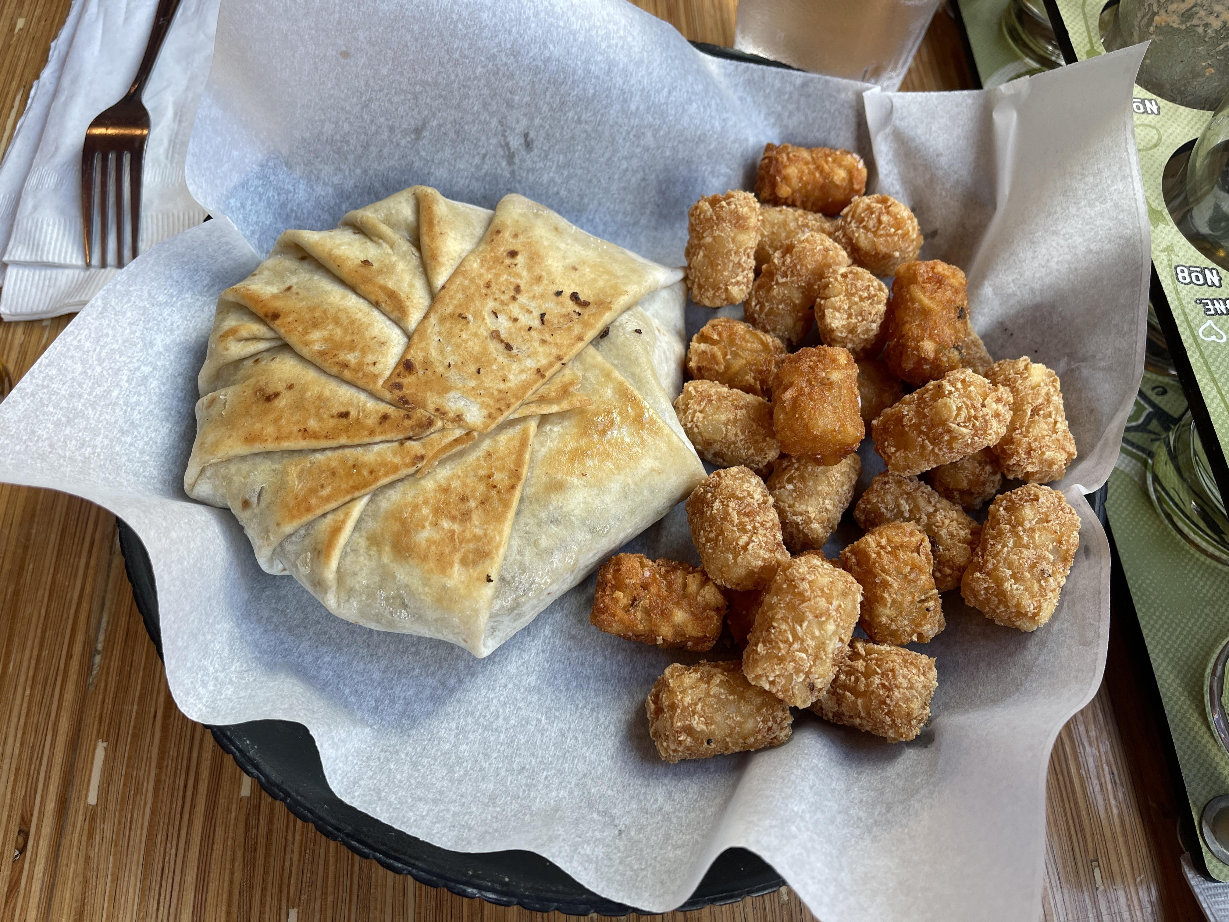 Crunchwrap burger and tots from Pig Minds in Illinois. Sooooo tasty ...