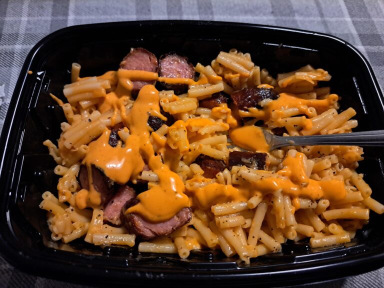 Leftover cheddar brats and Aldi brand boxed mac and cheese. Microwaved ...