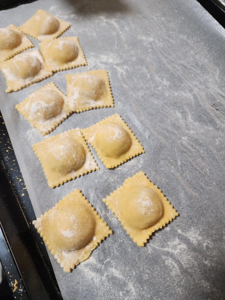 Confit duck, honey nut squash, and ricotta ravioli with brown butter ...