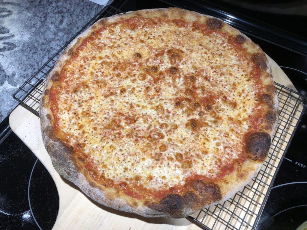Pizza night! In our house, first pie is always plain. How’s it look ...