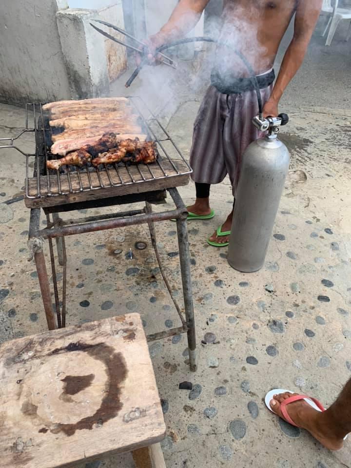 When diving and grilling in the Philippines, scuba tanks can pull ...