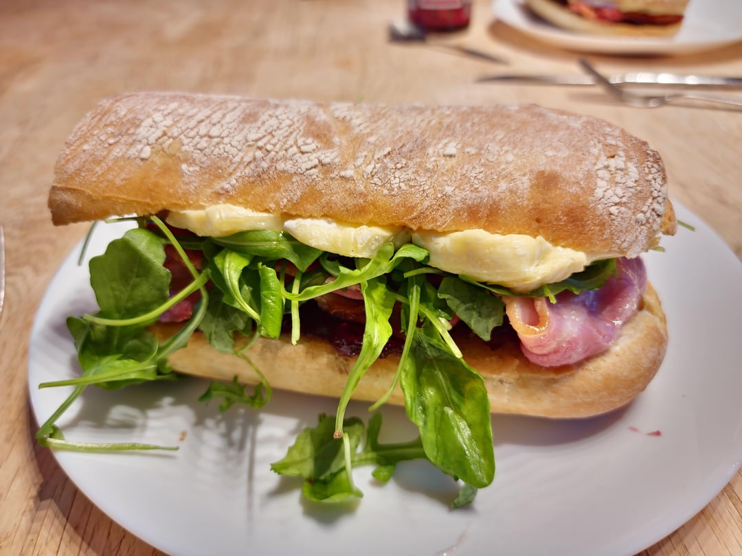 Bacon, brie, cranberry and rocket on stone baked ciabatta - as it's ...