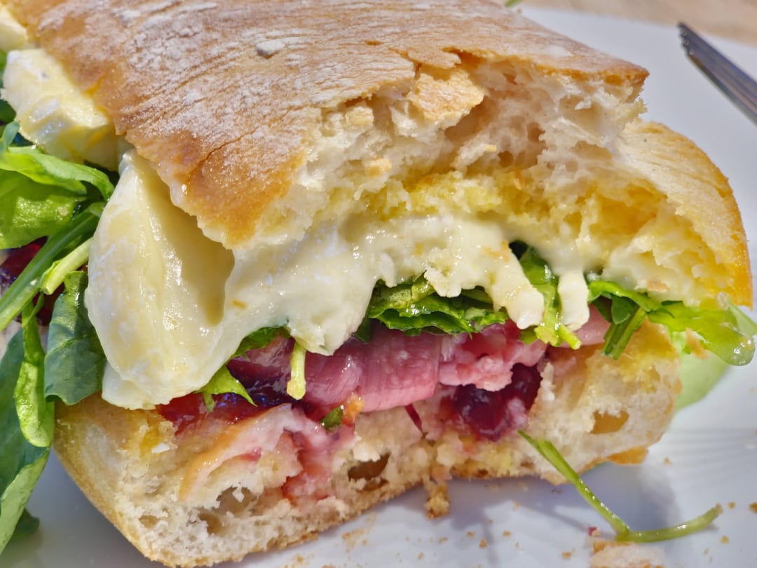Bacon, brie, cranberry and rocket on stone baked ciabatta - as it's ...
