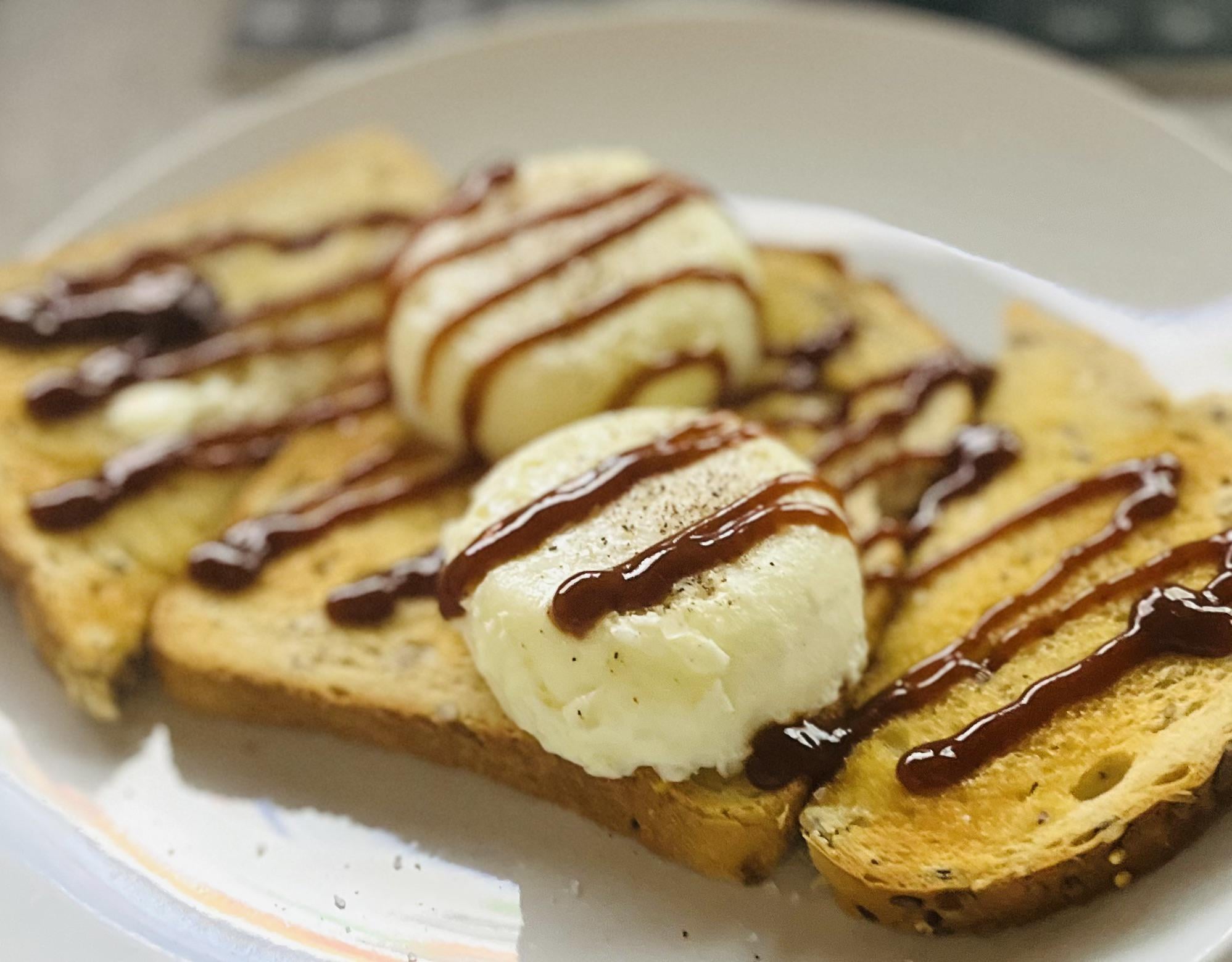 Hard to beat poached eggs on toast with HP sauce - Dining and Cooking