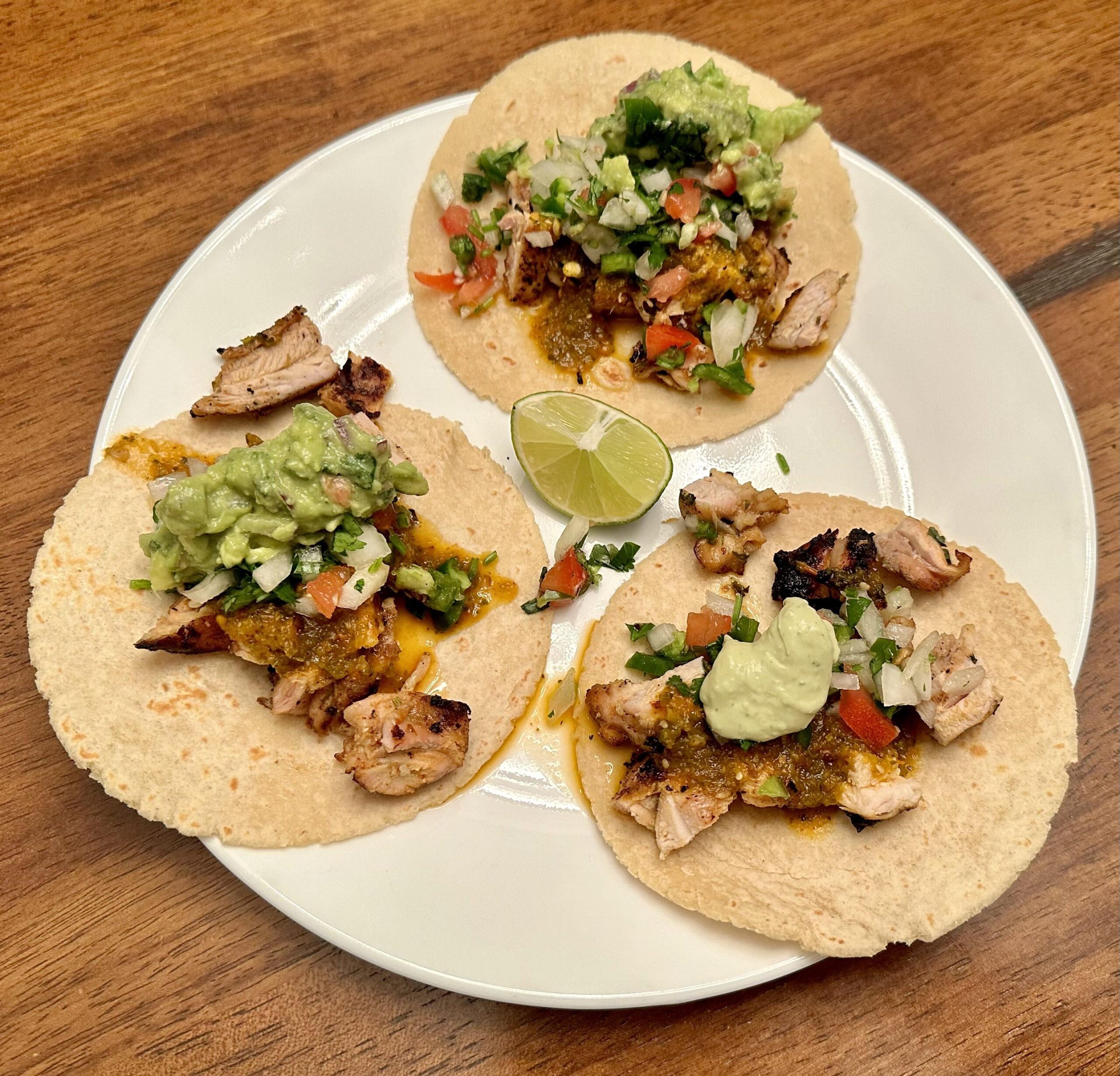 Pollo Asado tacos with roasted habanero and tomatillo salsa, guacamole ...