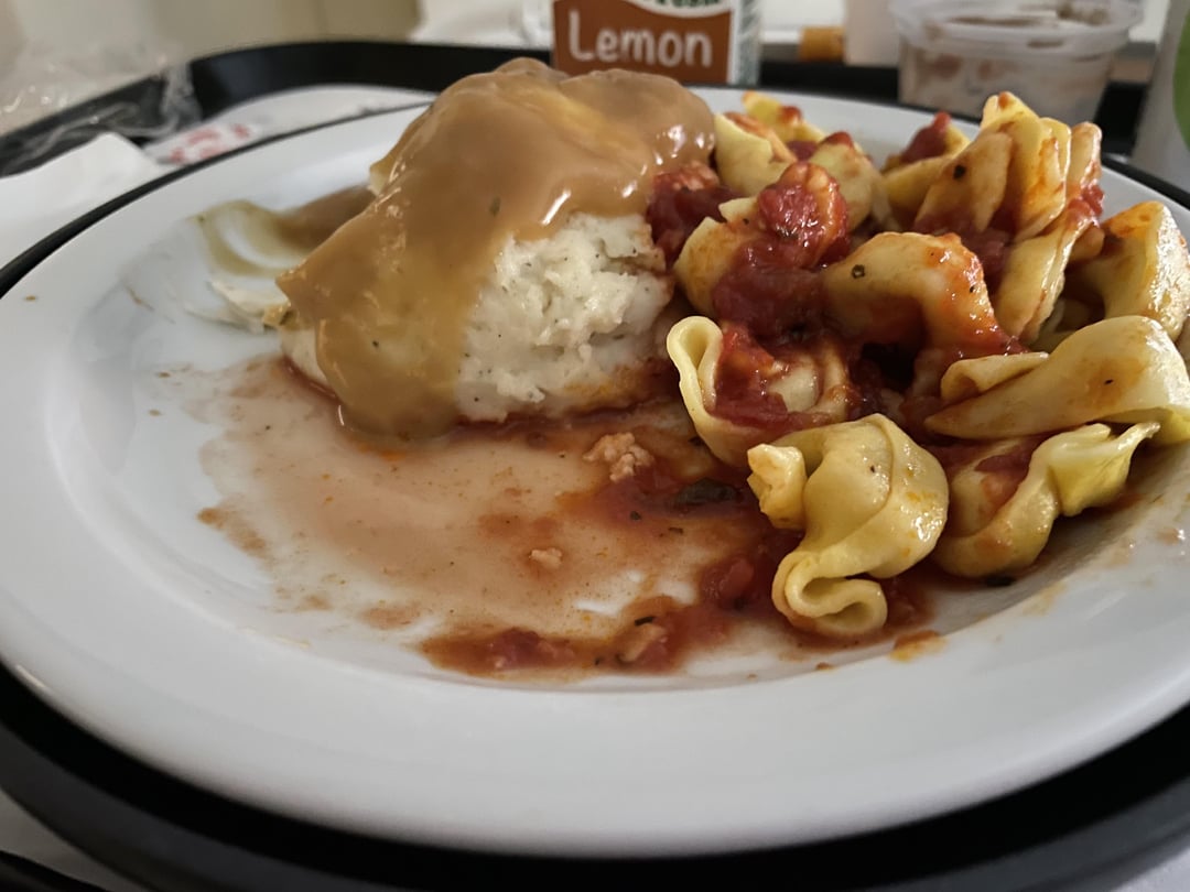 Hospital put my mashed potatoes with gravy next to my pasta. Both were ...