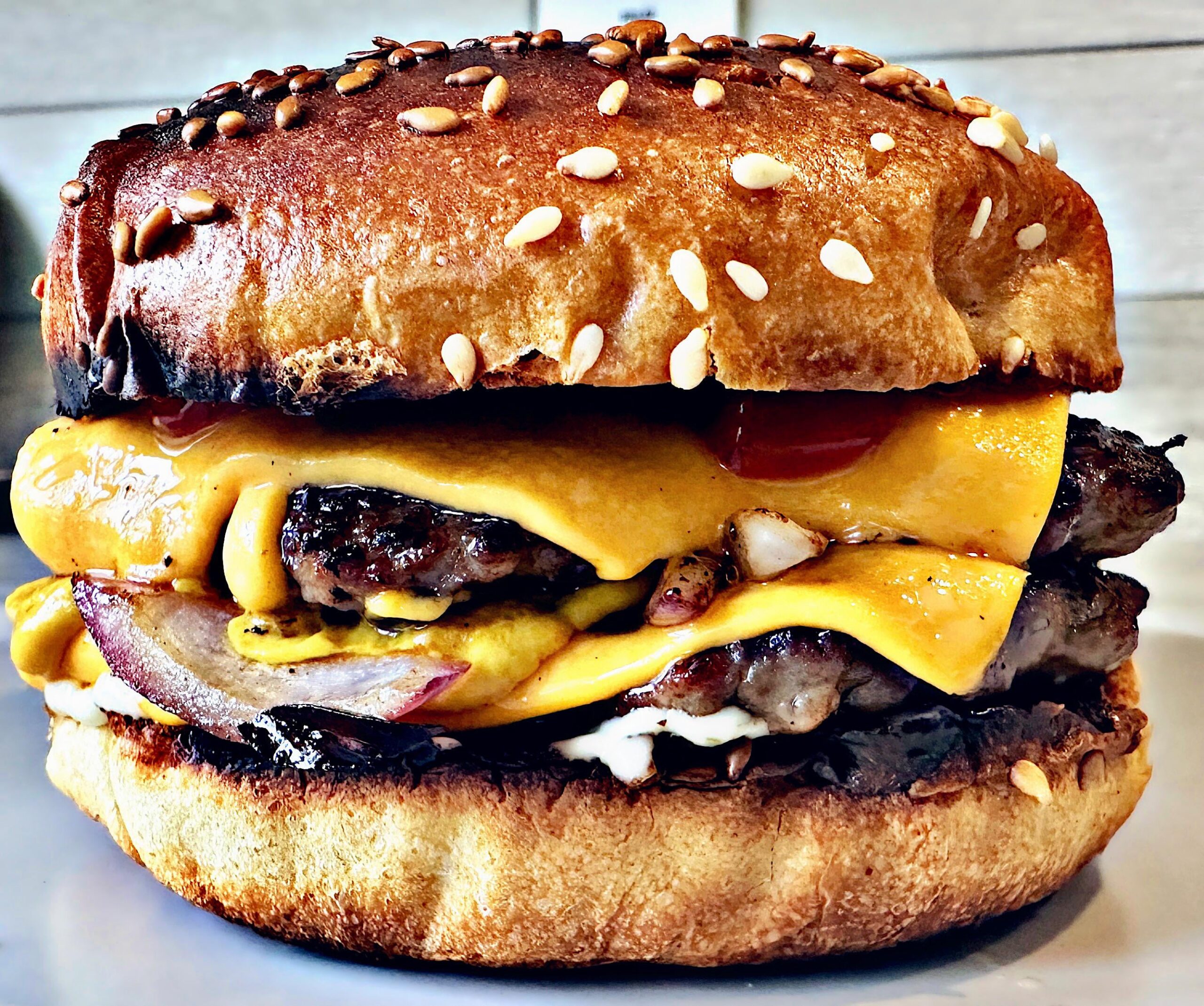 The classic: Double cheeseburger. Fried onions. Ketchup. Mustard. Done ...