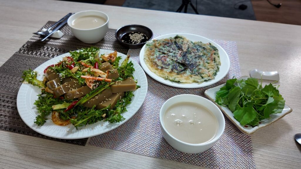 Dotori-muk (from scratch) and bang-aip buchu jeon with makgeolli (acorn ...