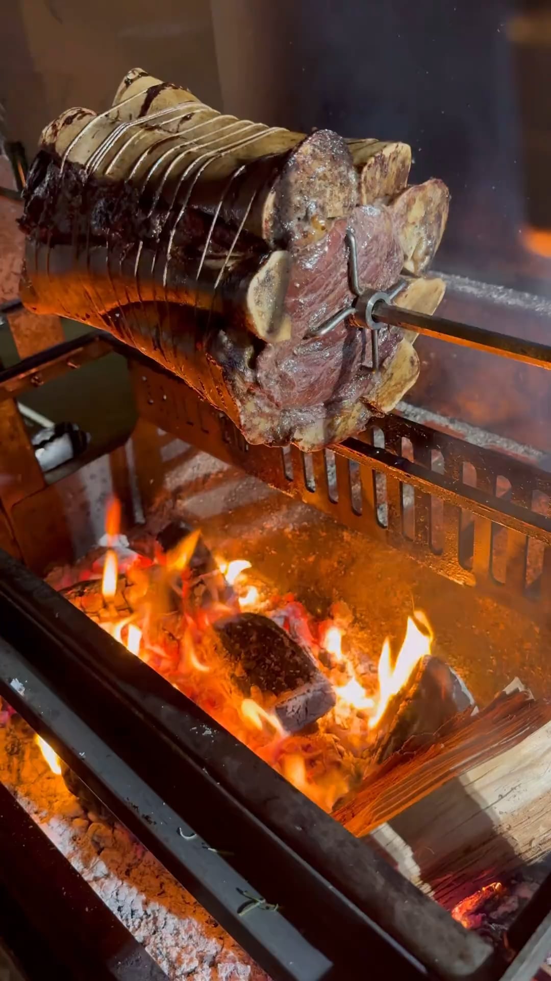 Prime Rib wrapped in bone marrow and cooked over fire - Dining and Cooking