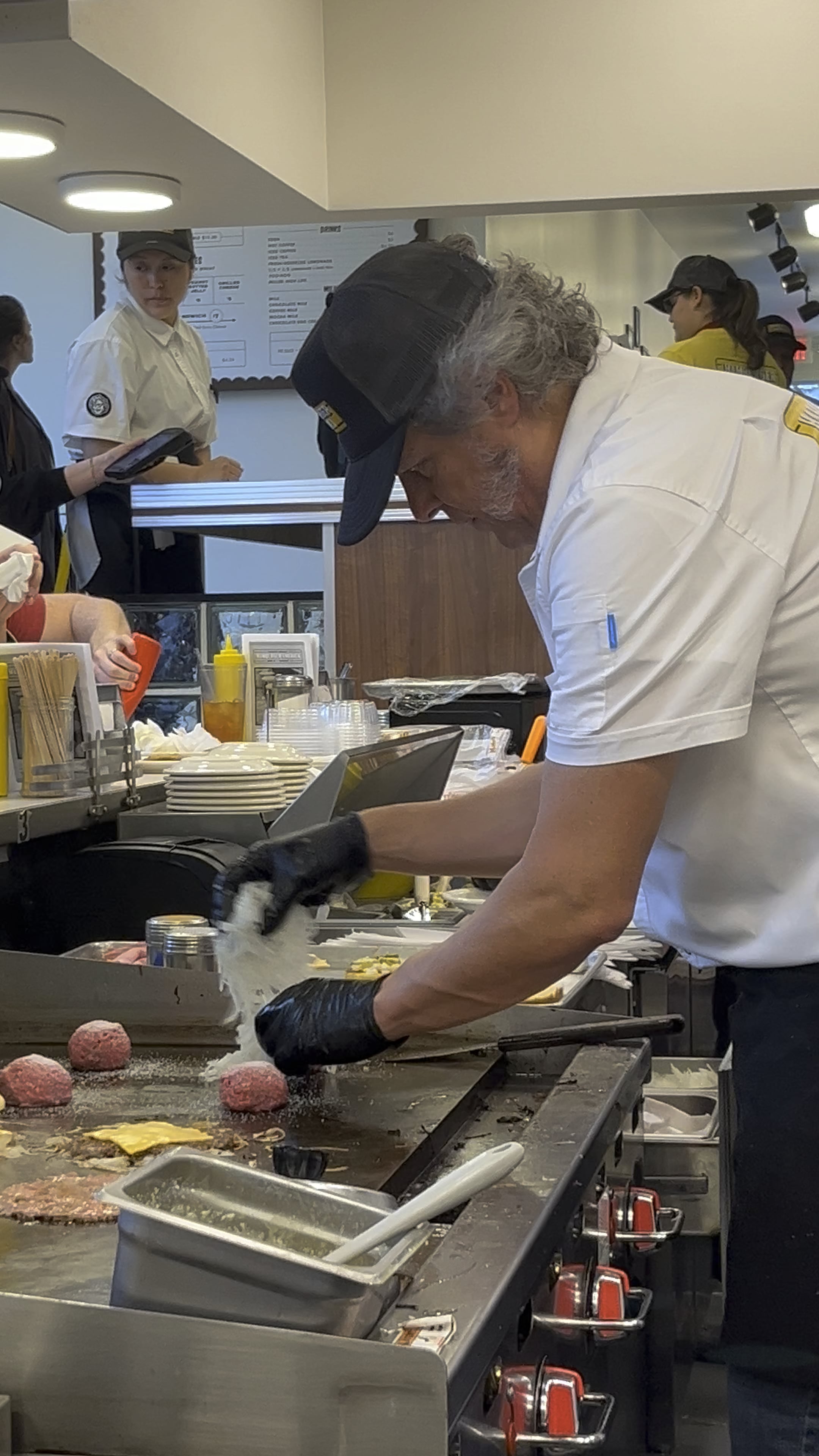 Counter service at George Motz’s Burger America - Dining and Cooking