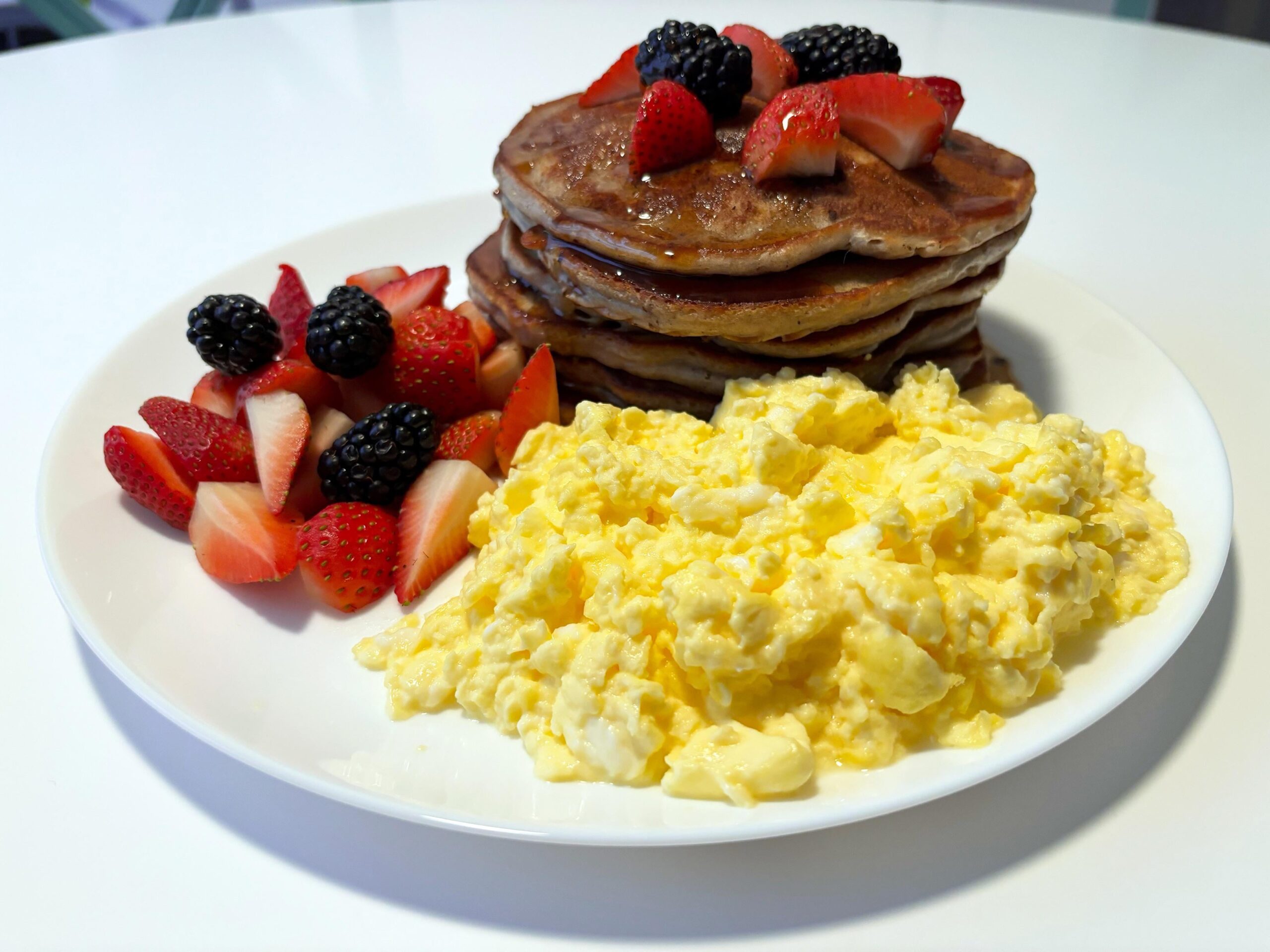 Late Saturday breakfast. Strawberry blackberry pancakes and eggs ...