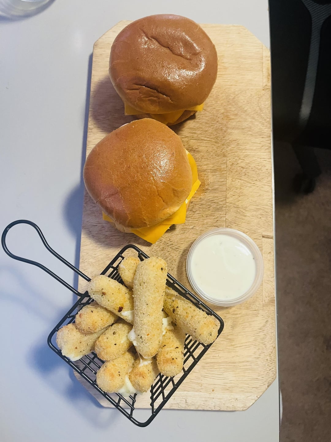 Mini triple cheese burgers with some air fried mozzarella sticks ...