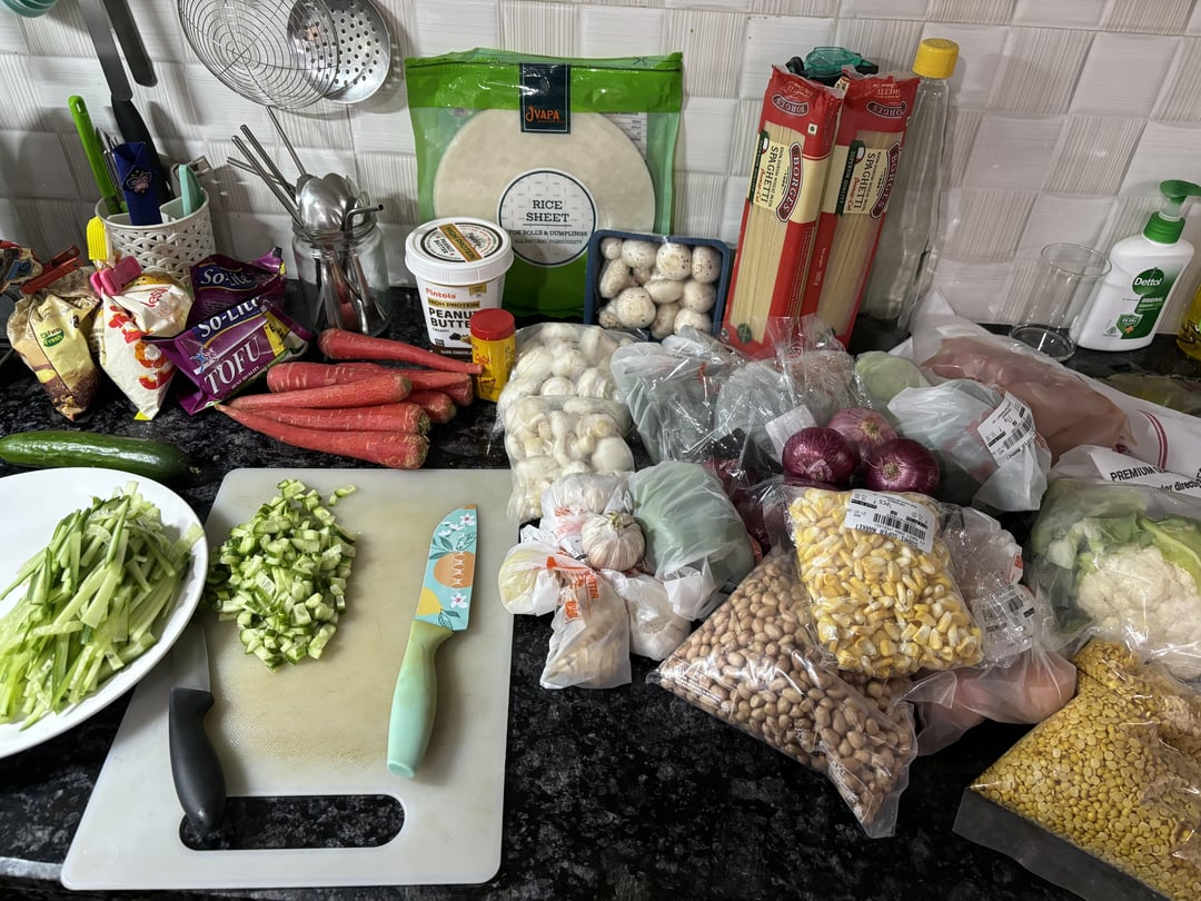 Chicken breast and spaghetti with baked veggies, spring rolls and ...