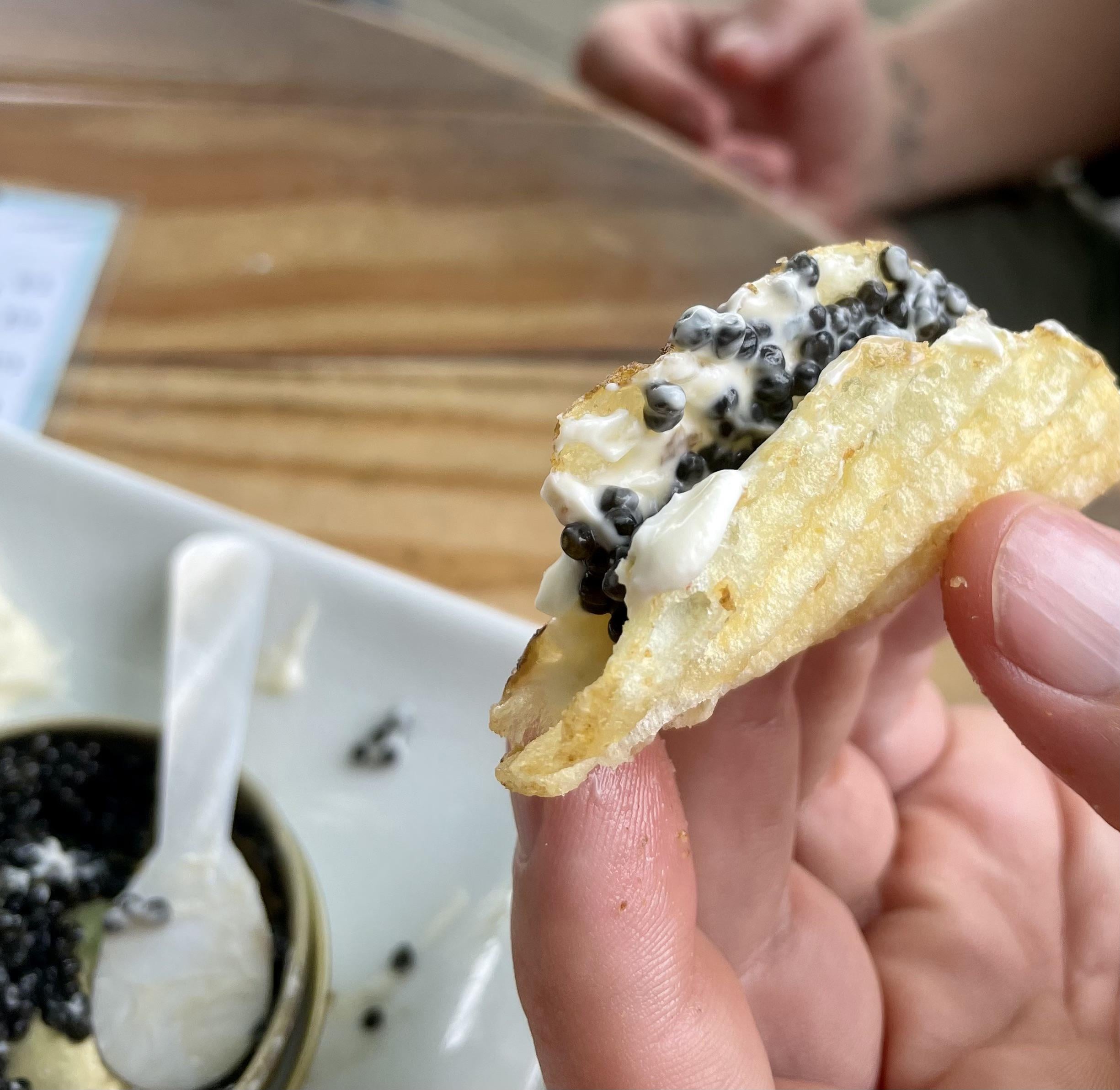My friend made a mini chip caviar taco. - Dining and Cooking