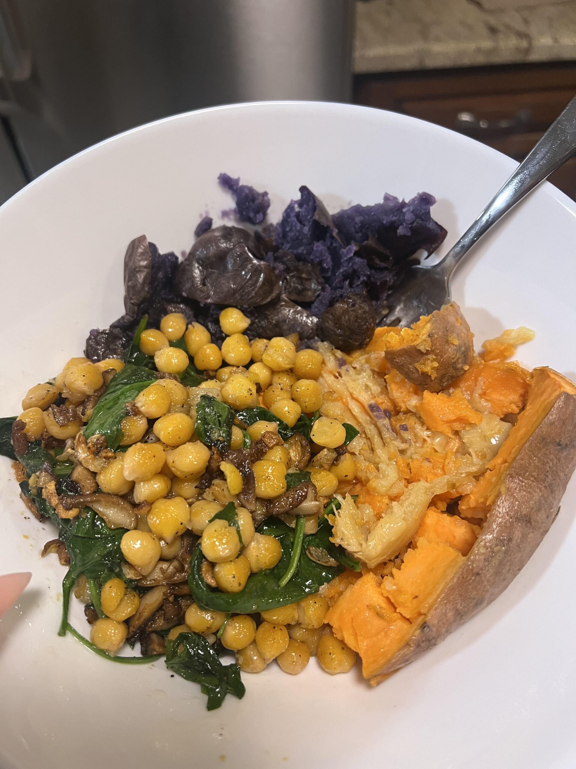 Sweet potatoe, blue baby Dutch potatoes, wilted spinach, chickpeas ...