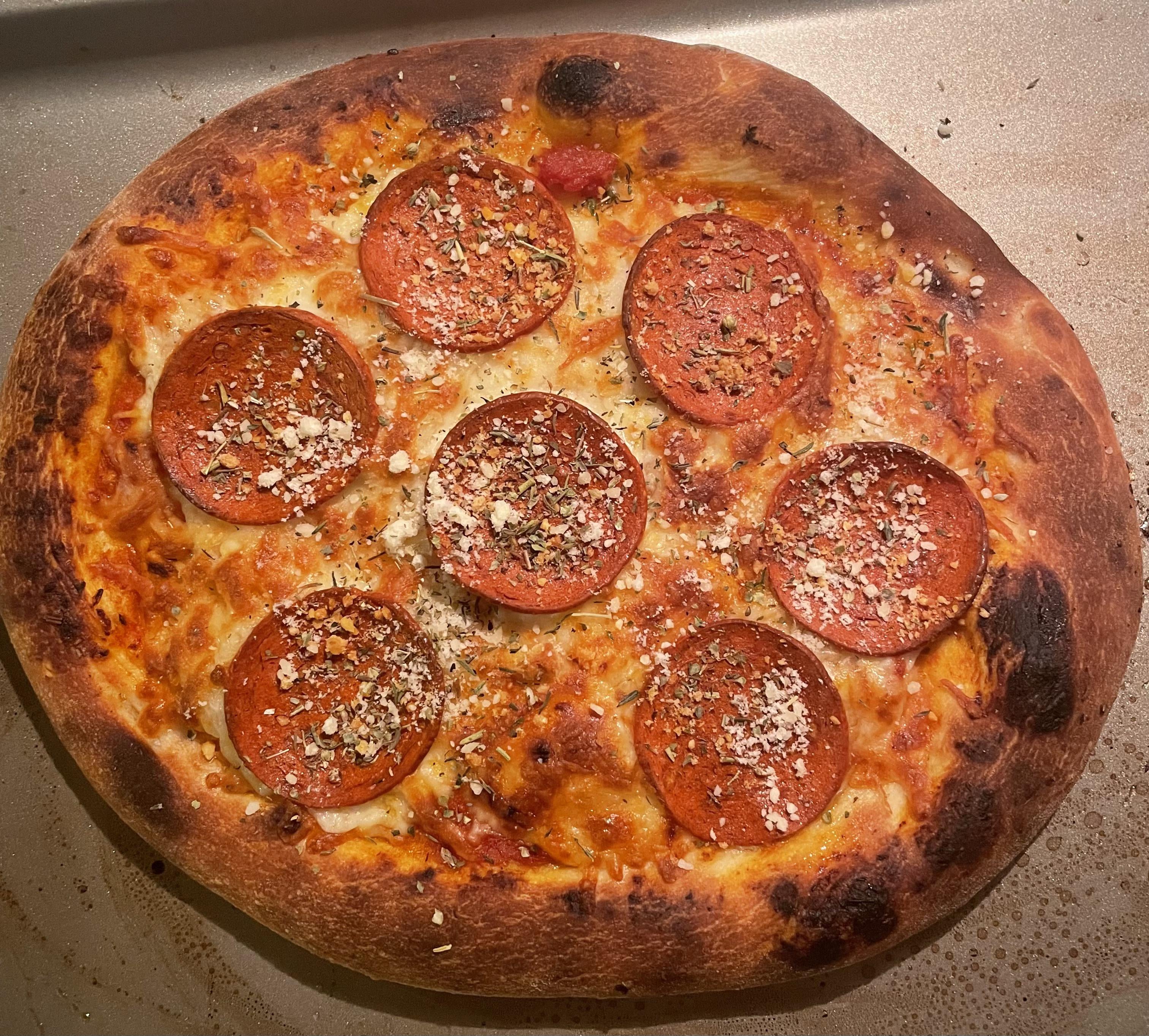 Homemade cheese pizza with plant based pepperoni - Dining and Cooking