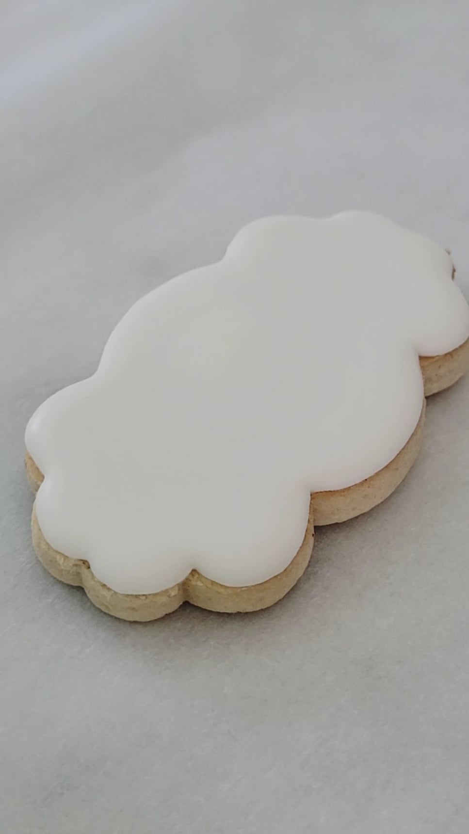 Airbrushing clouds on a cookie. - Dining and Cooking