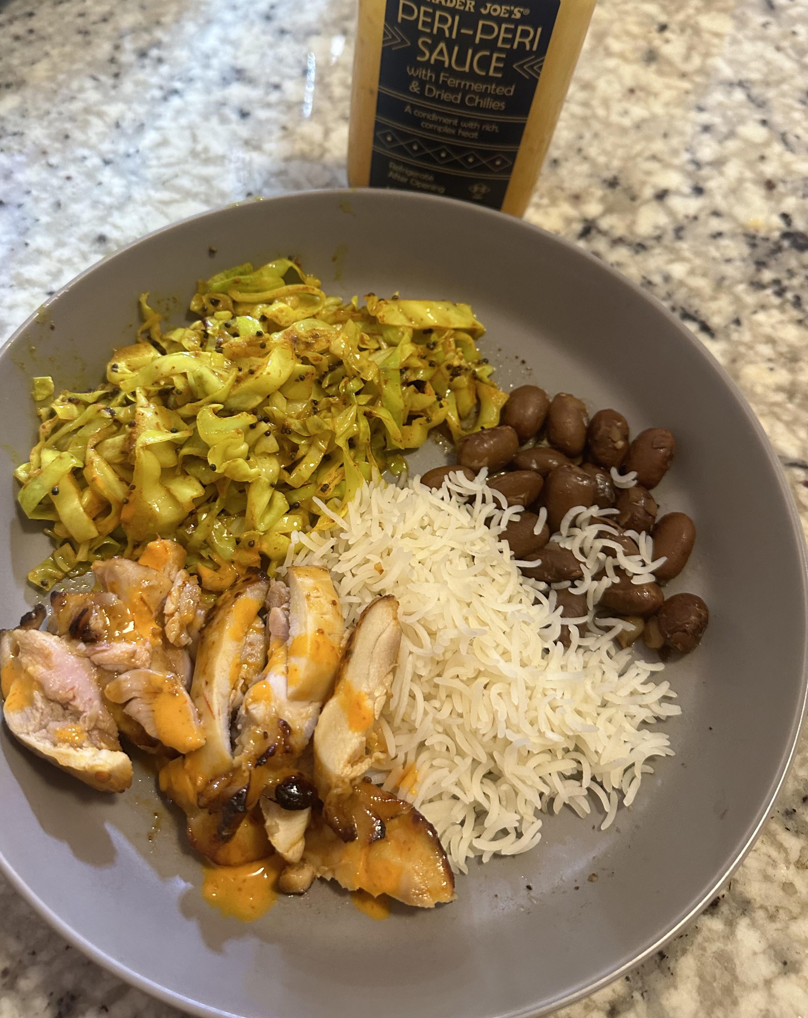Peri peri chicken, stir fried cabbage, beans and rice - Dining and Cooking