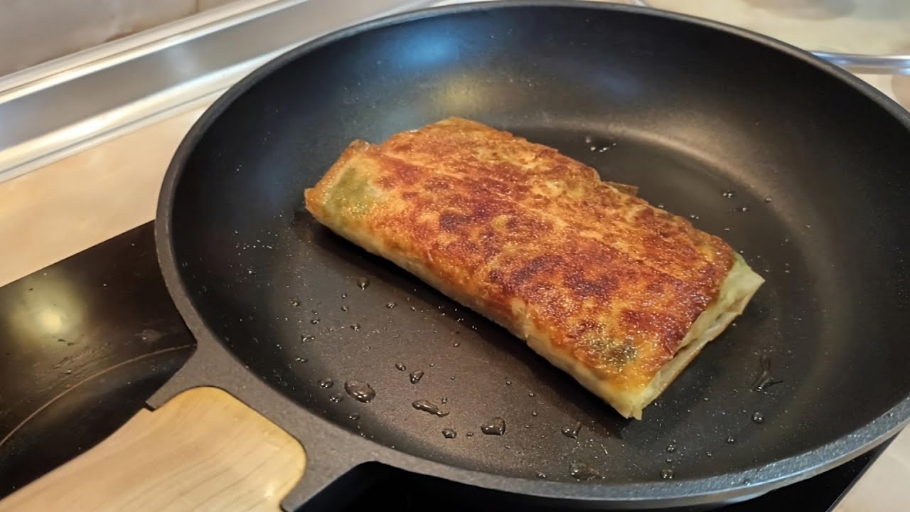 Healthy breakfast with eggs, cheese, spinach and yellow cheese. Filo ...