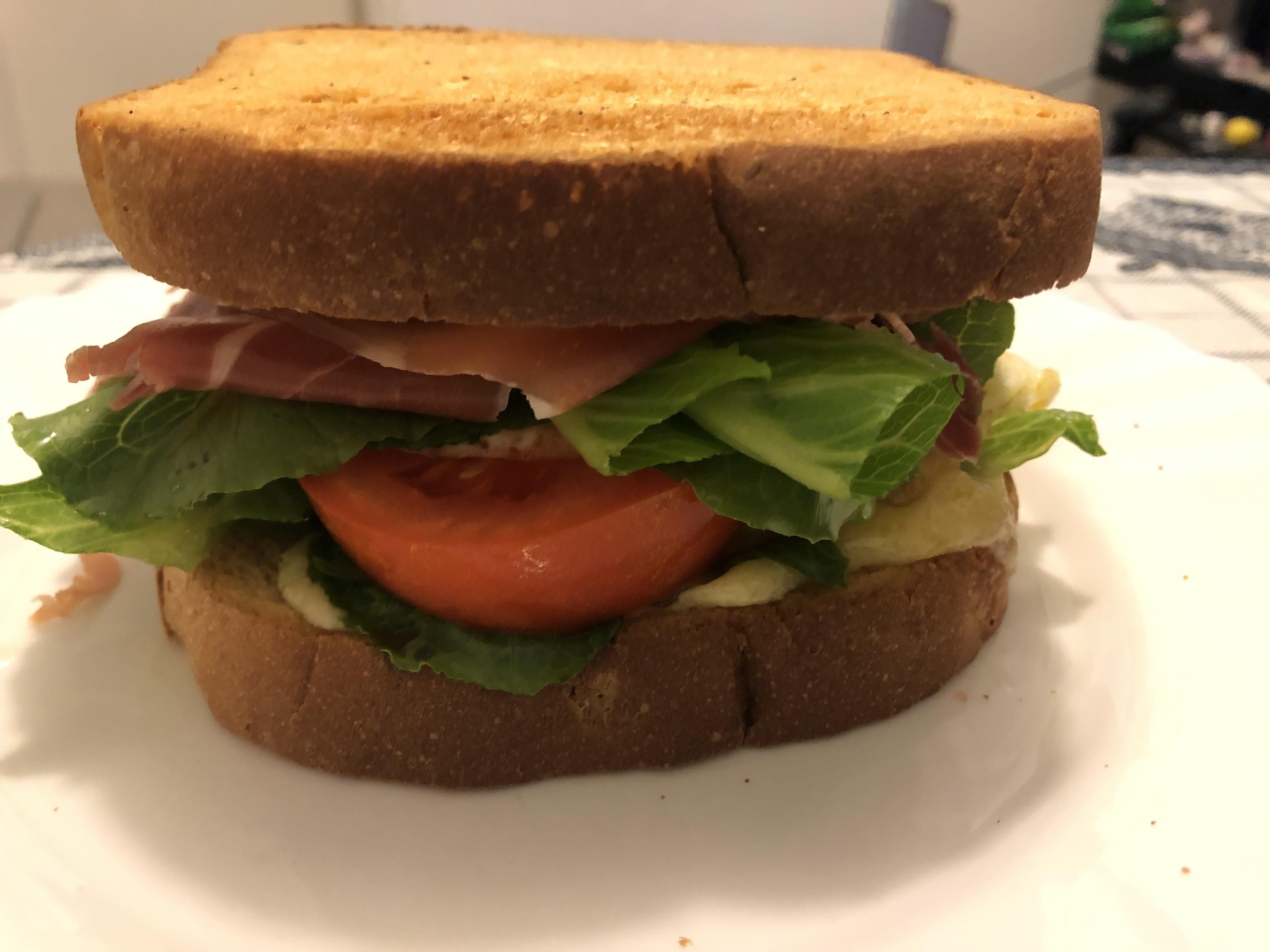 [OC] Cheese, egg, lettuce, tomato, Parma ham sandwich after workout ...