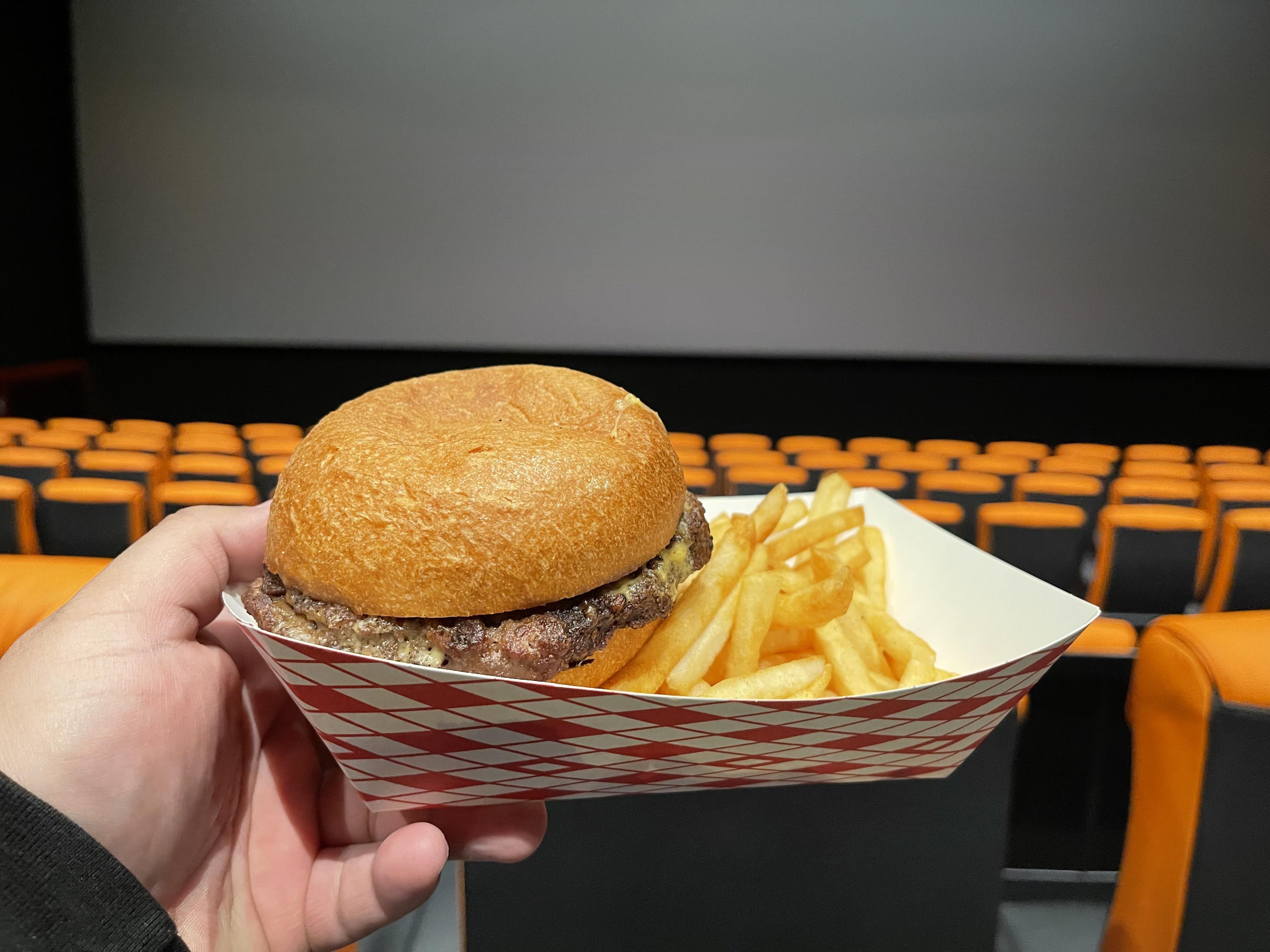 Humble but very delicious Cheeseburger and fries from Regal Cinema, San ...