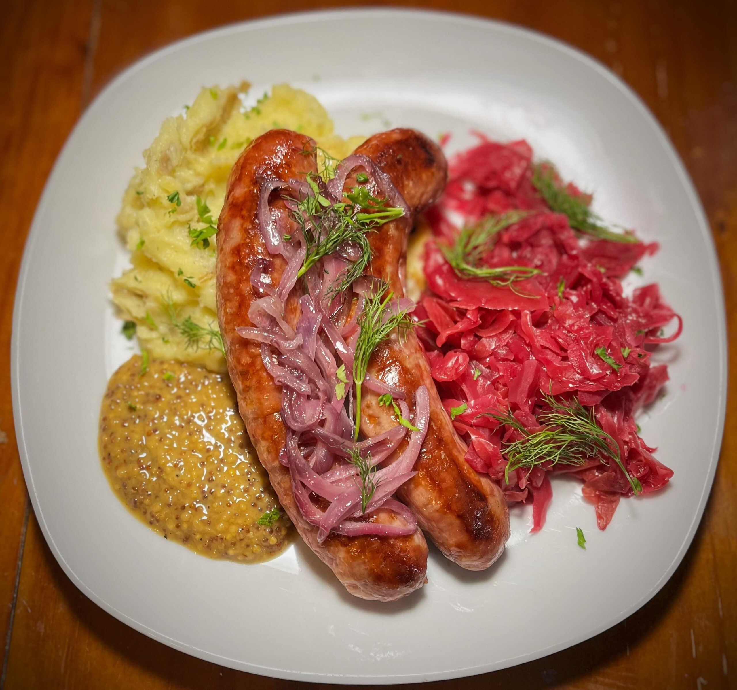 I made beer glazed bratwurst with red onions, sauerkraut, german-style ...