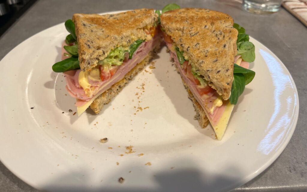 Thinly sliced Honey ham and Swiss cheese with lamb’s lettuce and ...