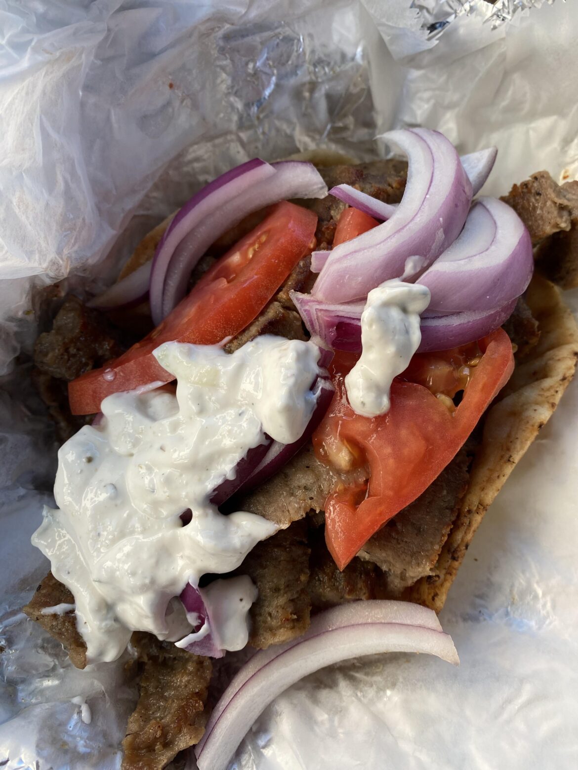 Gyro with Onions Tomato and Tzatziki on Pita - Dining and Cooking