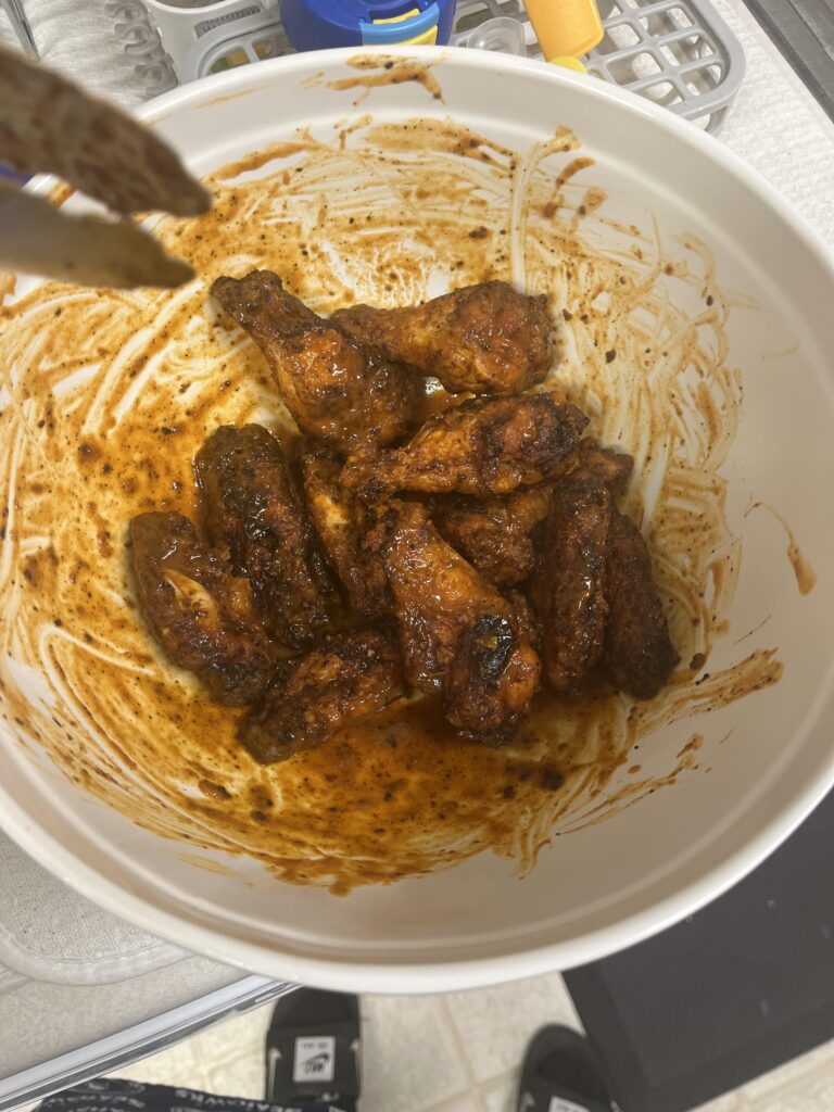 Air fried and deep fried. Hot Ones Buffalo sauce. - Dining and Cooking