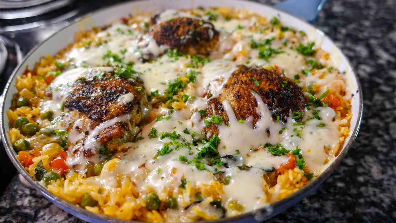 One Pan Cheesy Chicken and Rice Recipe - Dining and Cooking