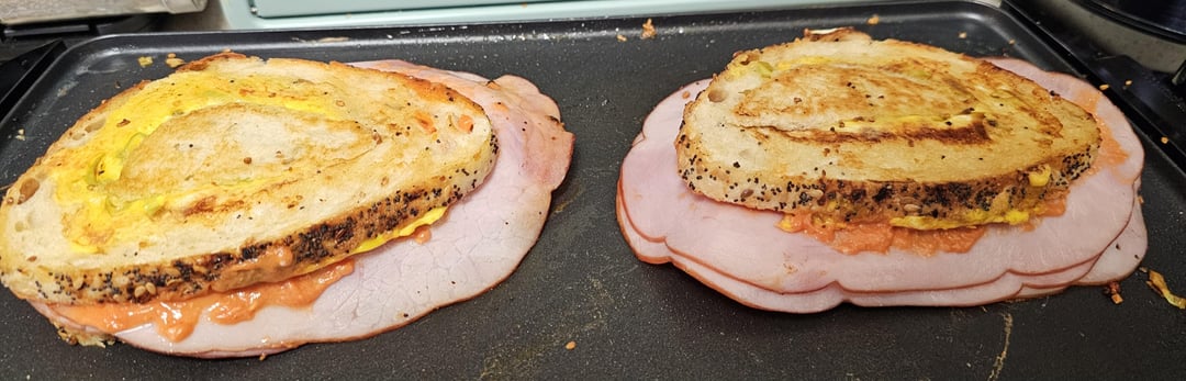Ham egg & cheese breakfast sandos for the wife and I this morning ...