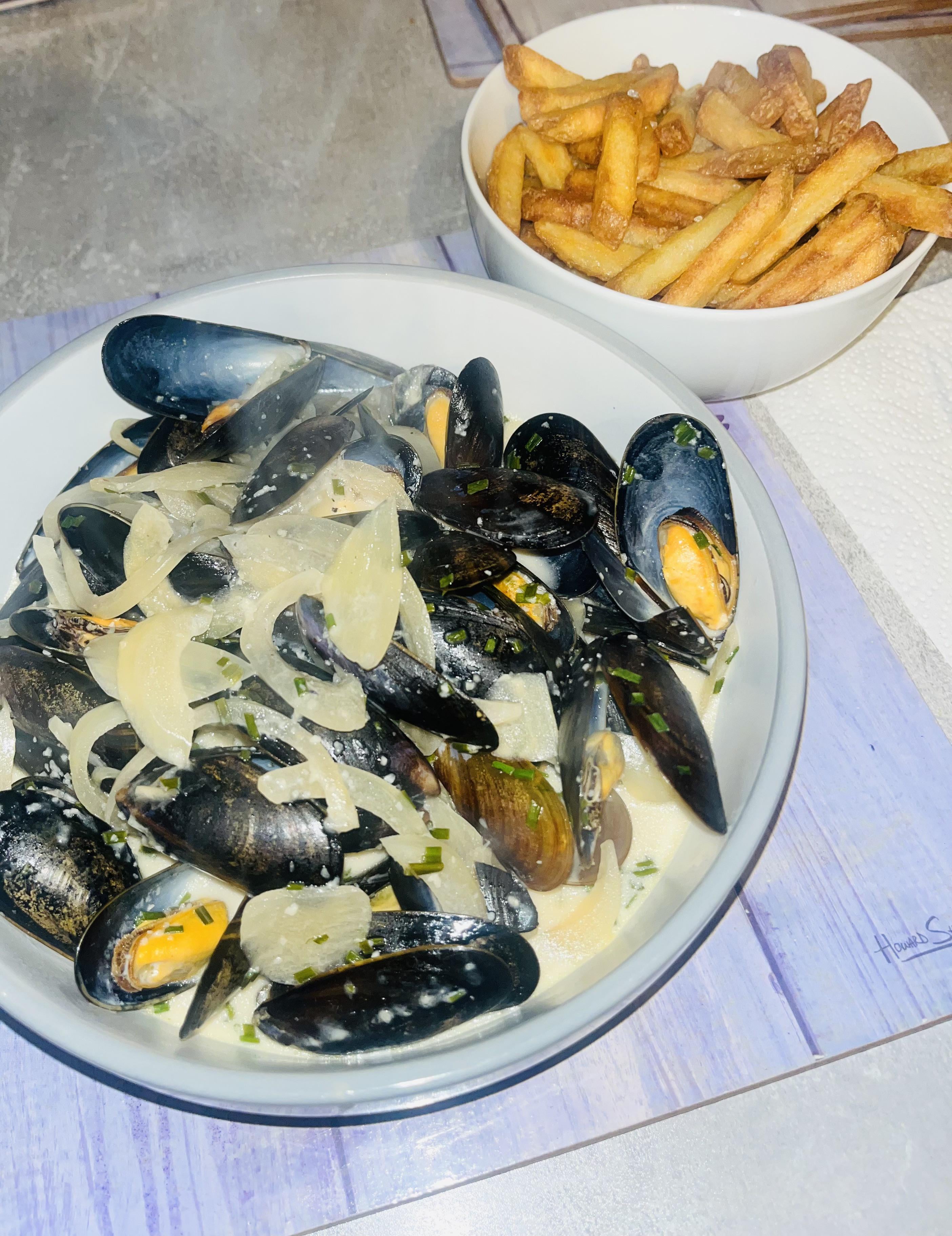 Local mussels with a white wine sauce and homemade chips. Amazing ...