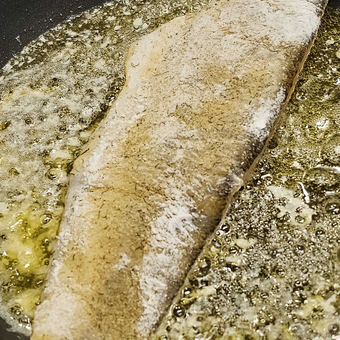 Fried fillet of pike-perch with roasted almonds in a lemon-butter sauce ...