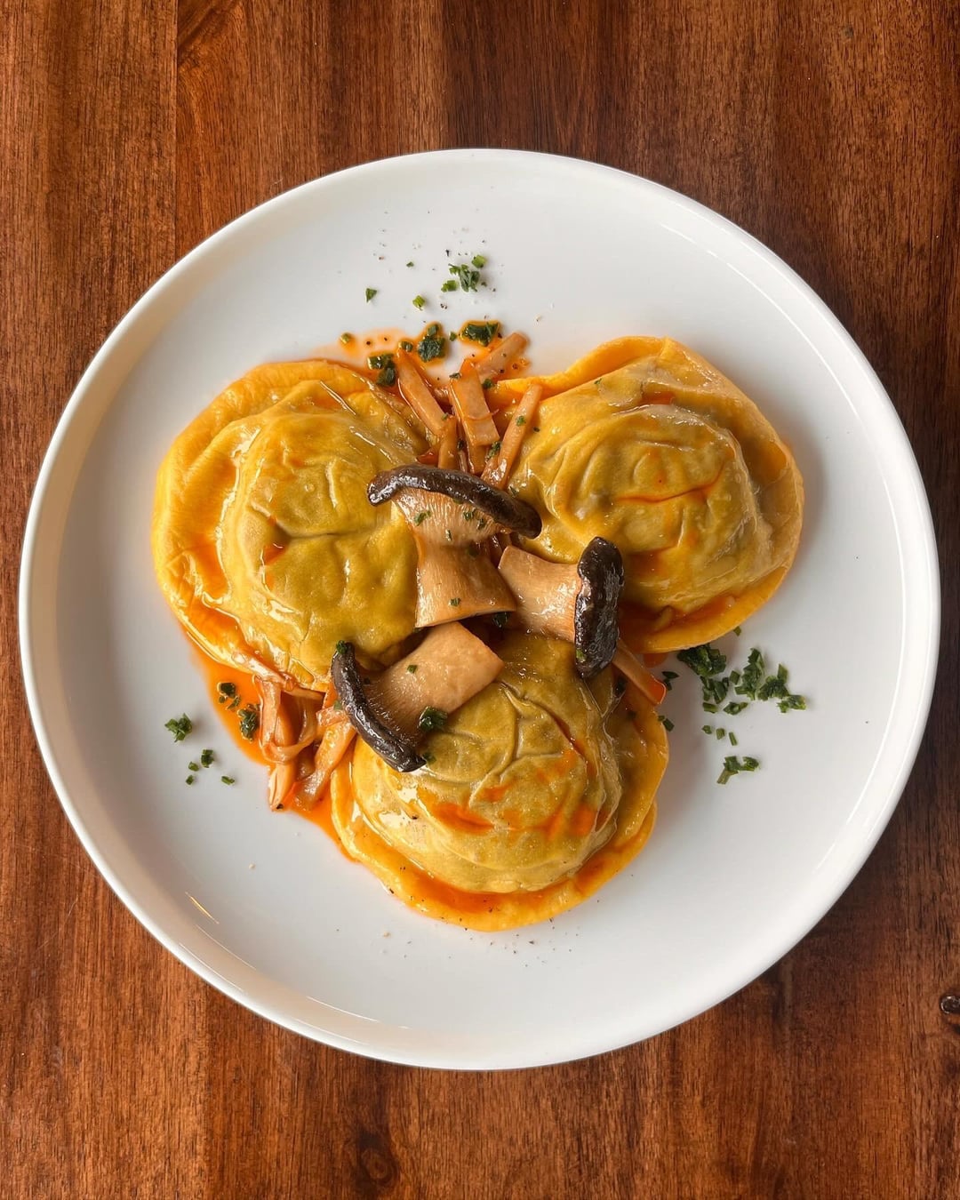 braised short rib ravioli sautéed in truffle butter and king oyster ...